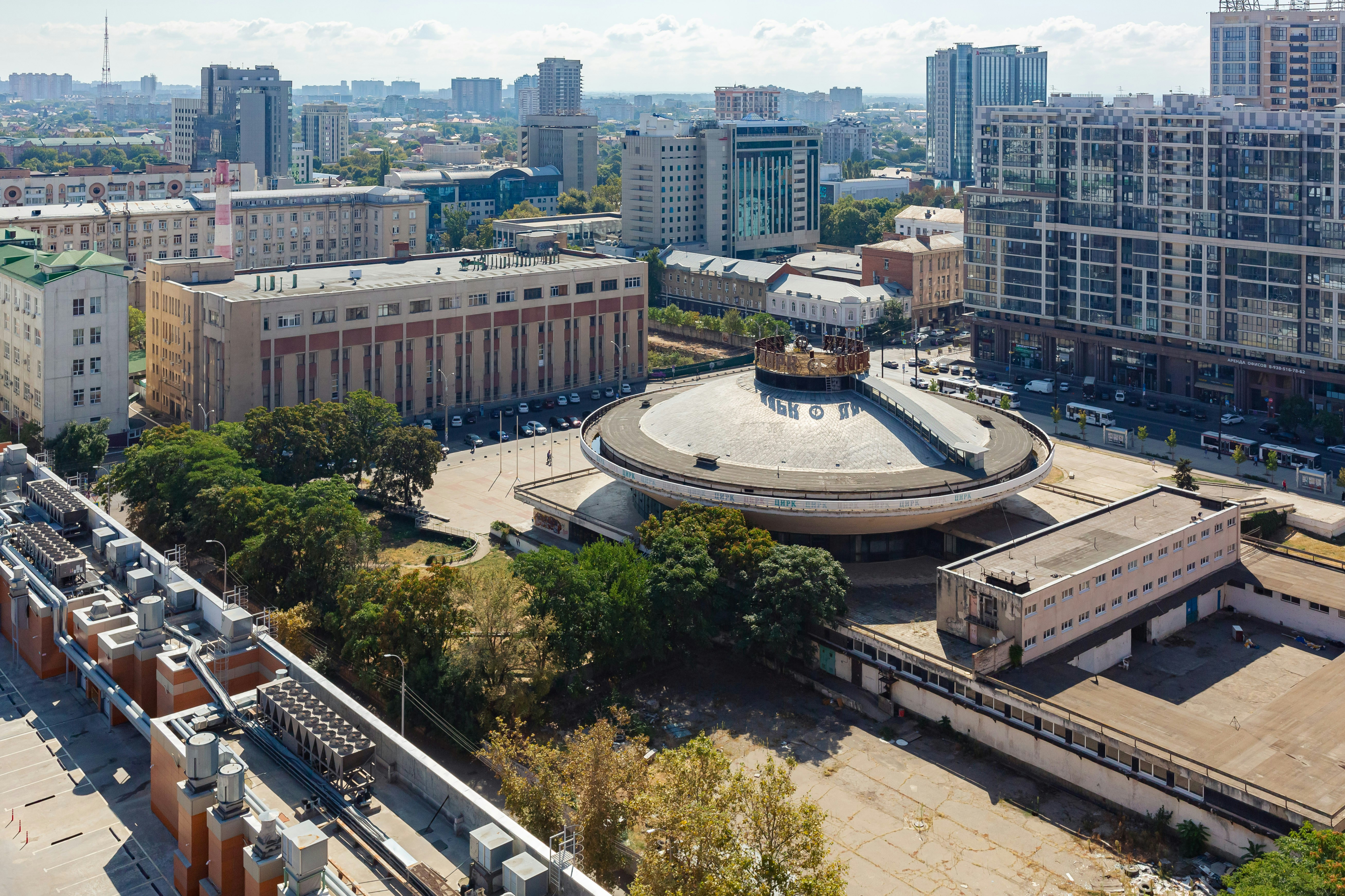 Circular Rotunda at the City Core: Aerial View of Modern Campus Towers