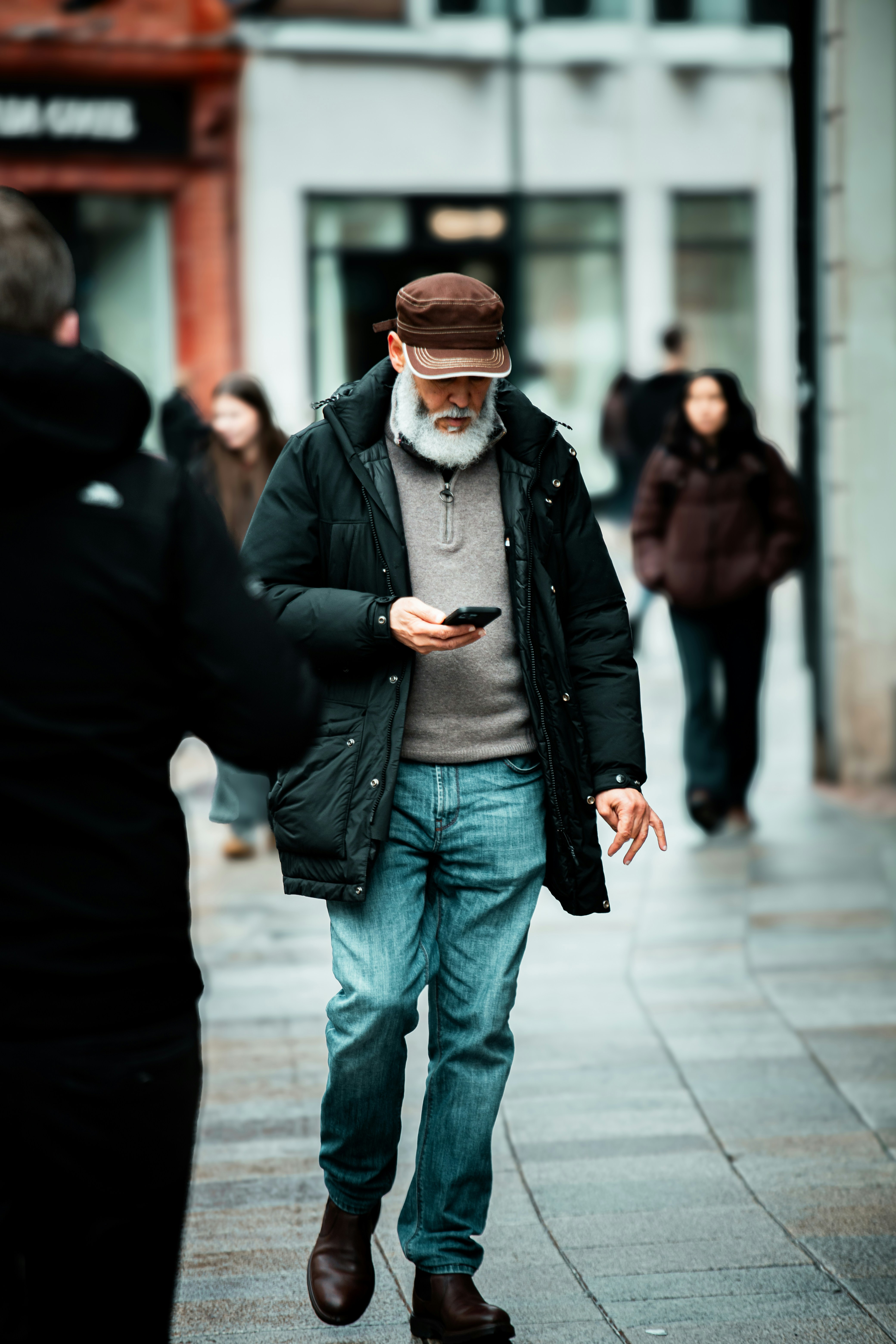 Urban Portrait: A Weathered Reader in a Quiet Street