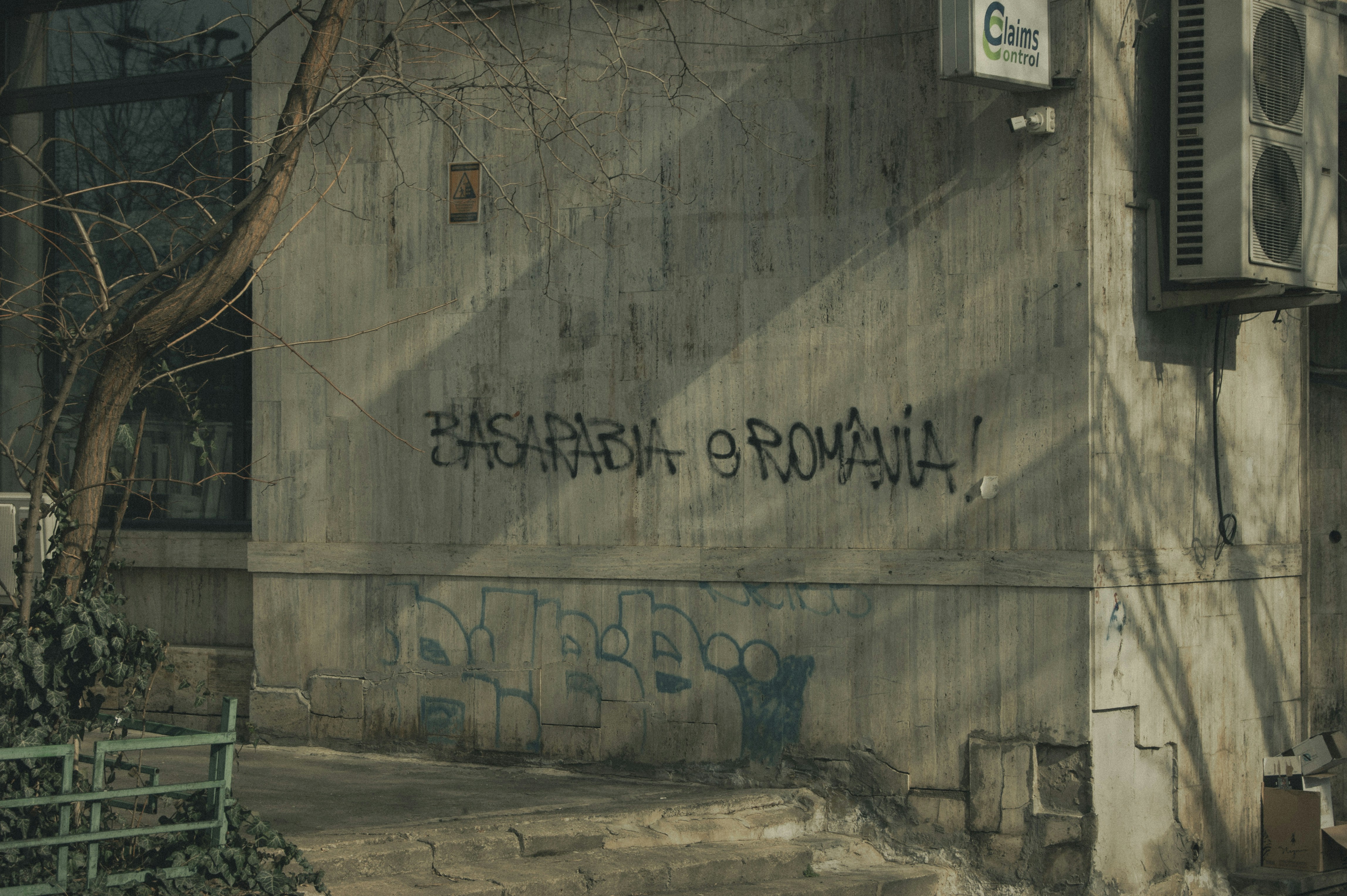 Graffiti Echoes on a Weathered Wall