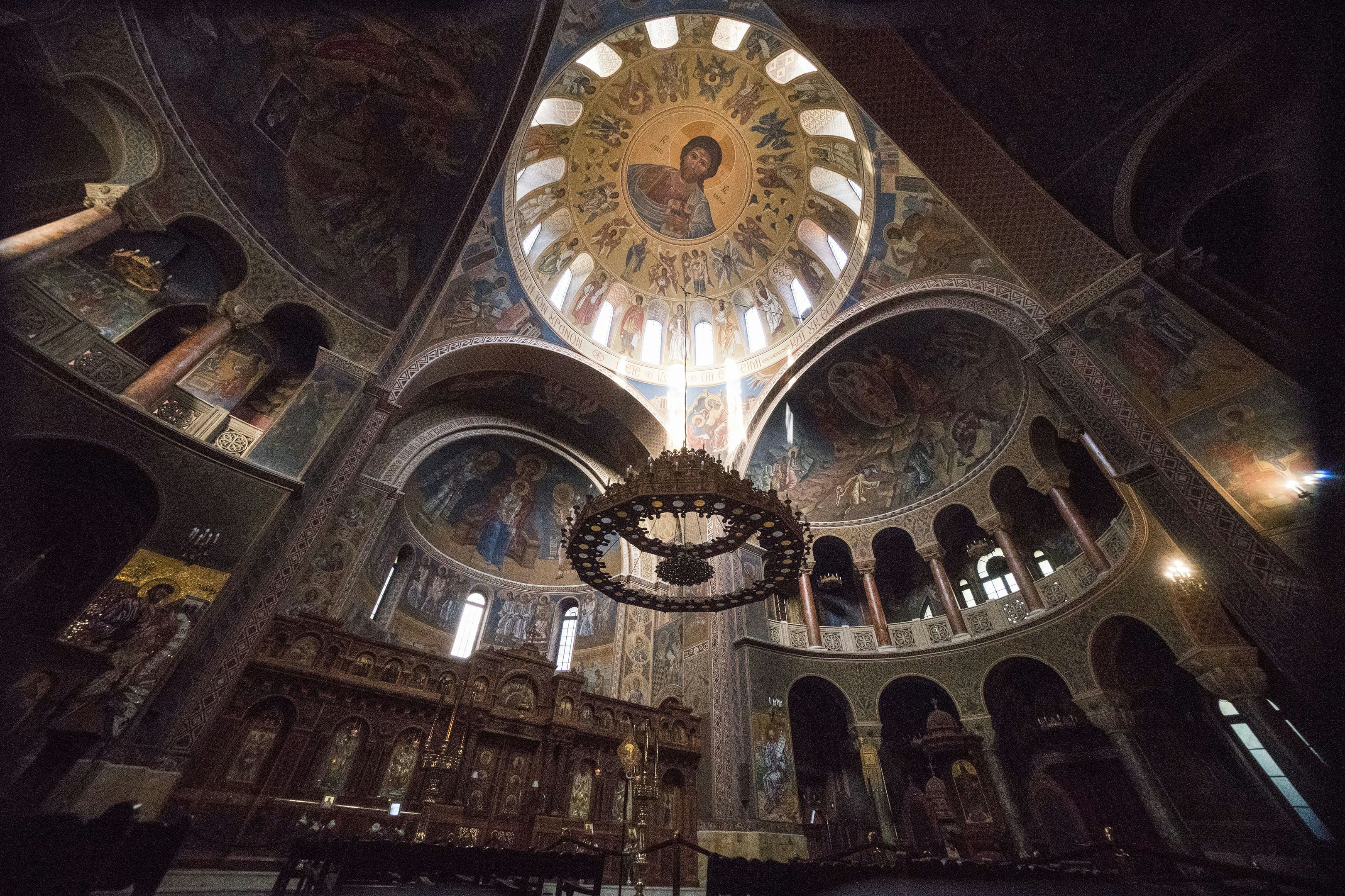 Celestial Dome: A Dimly Lit Byzantine Cathedral's Central Apse