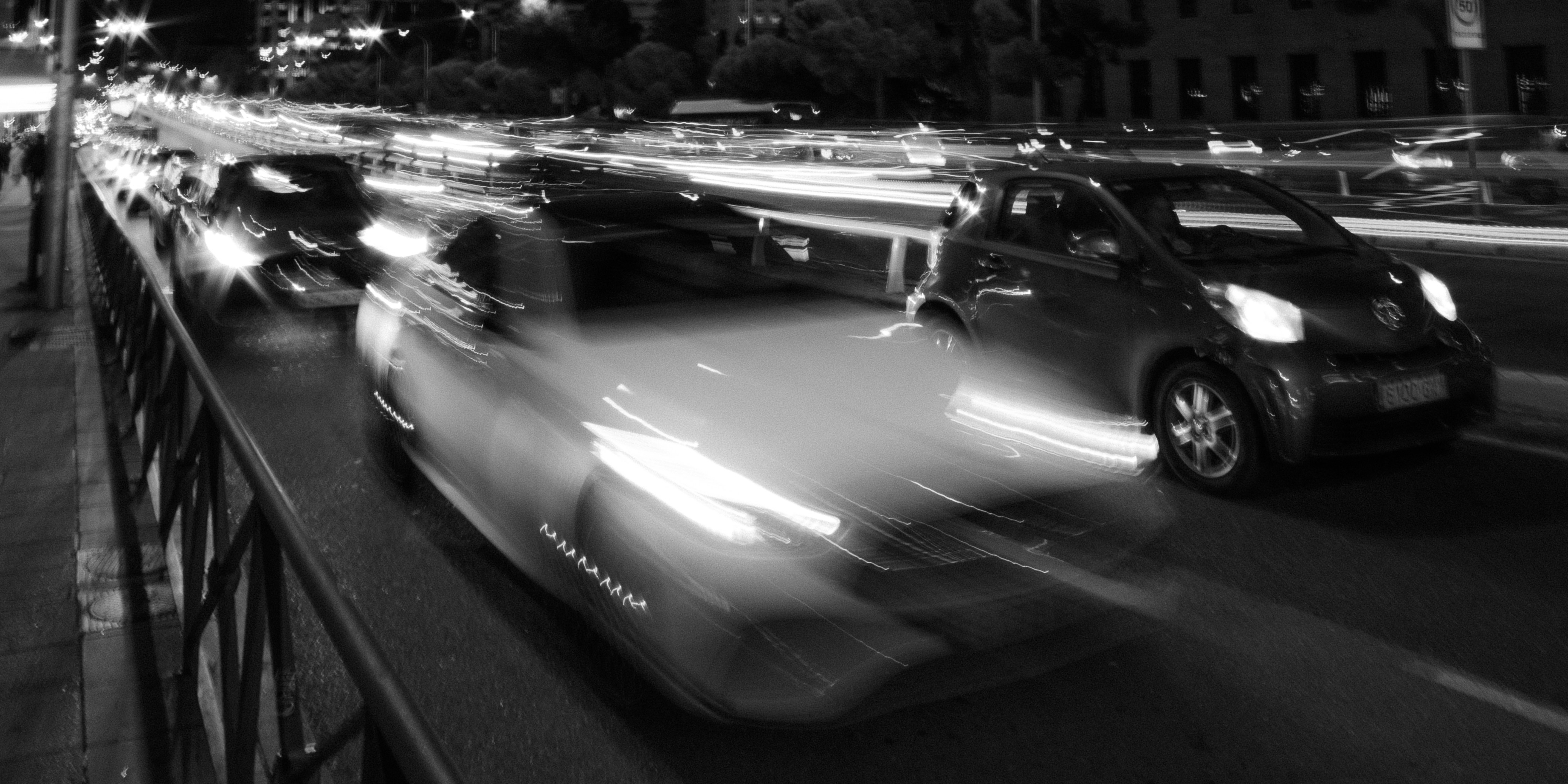 Headlights in Motion: A Blur of Night Traffic on a City Street