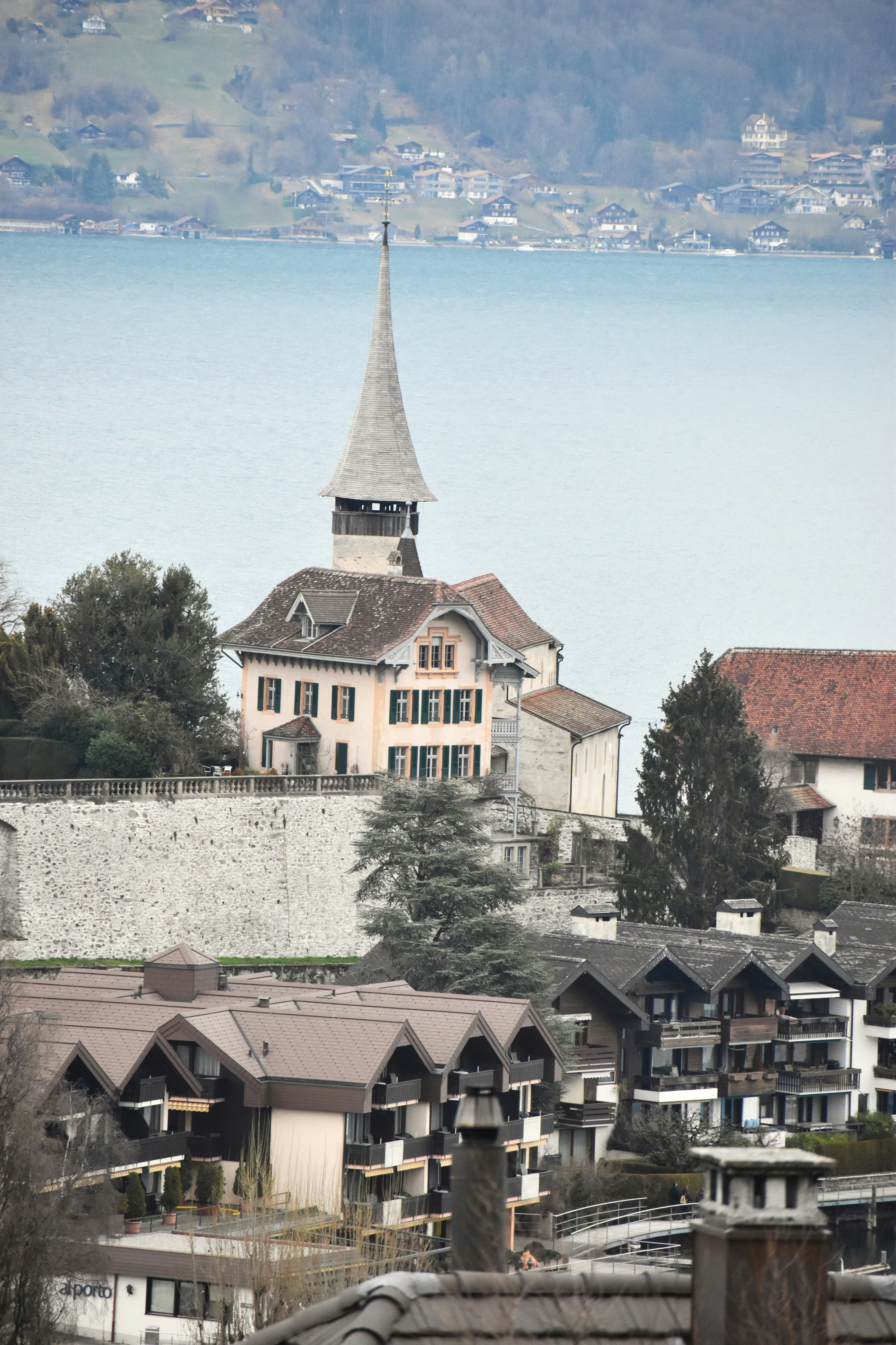 Turreted Village by the Lake: A Swiss-Chalet Snapshot