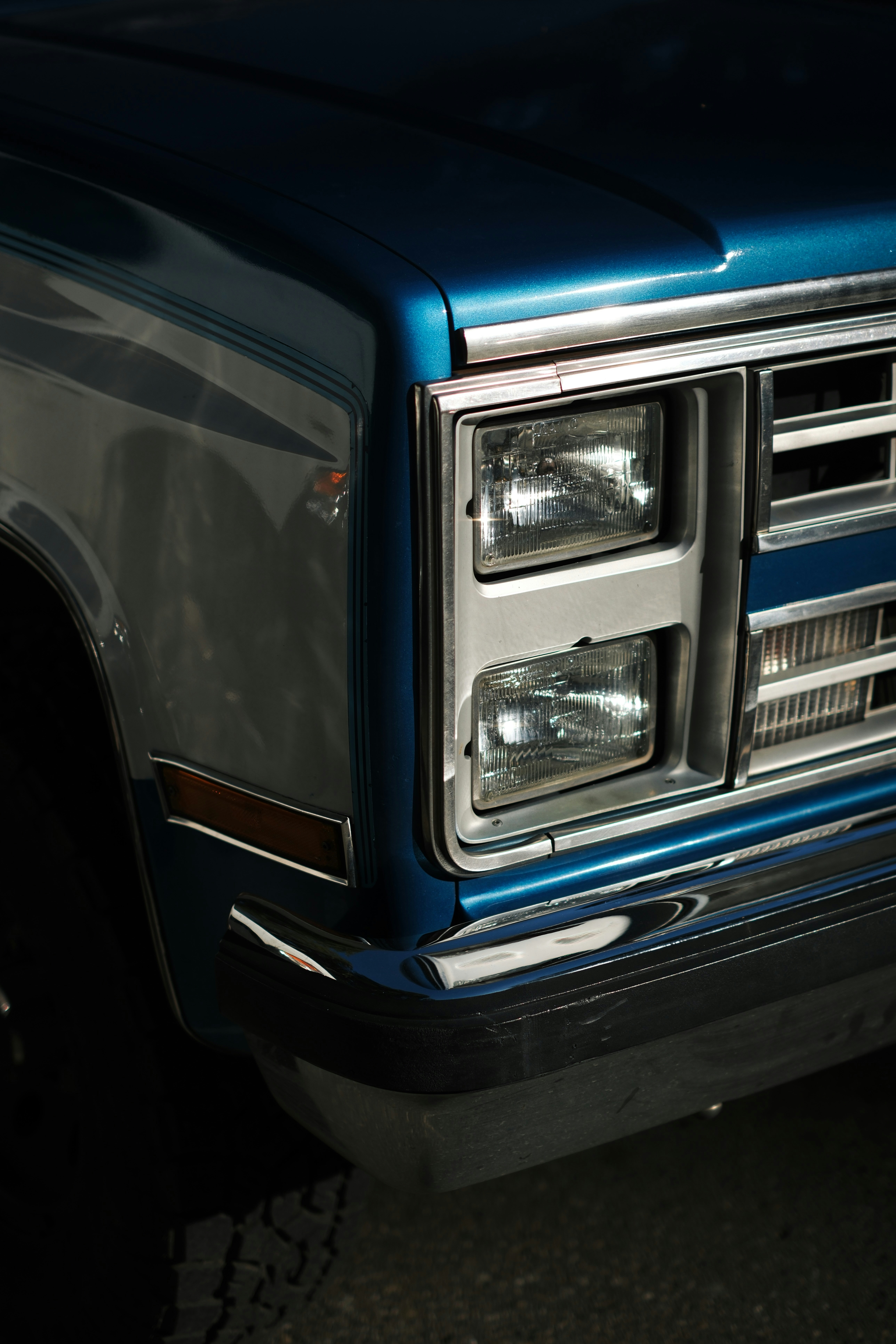 Blue Classic Grille: A Stalled Moment of Chrome and Light