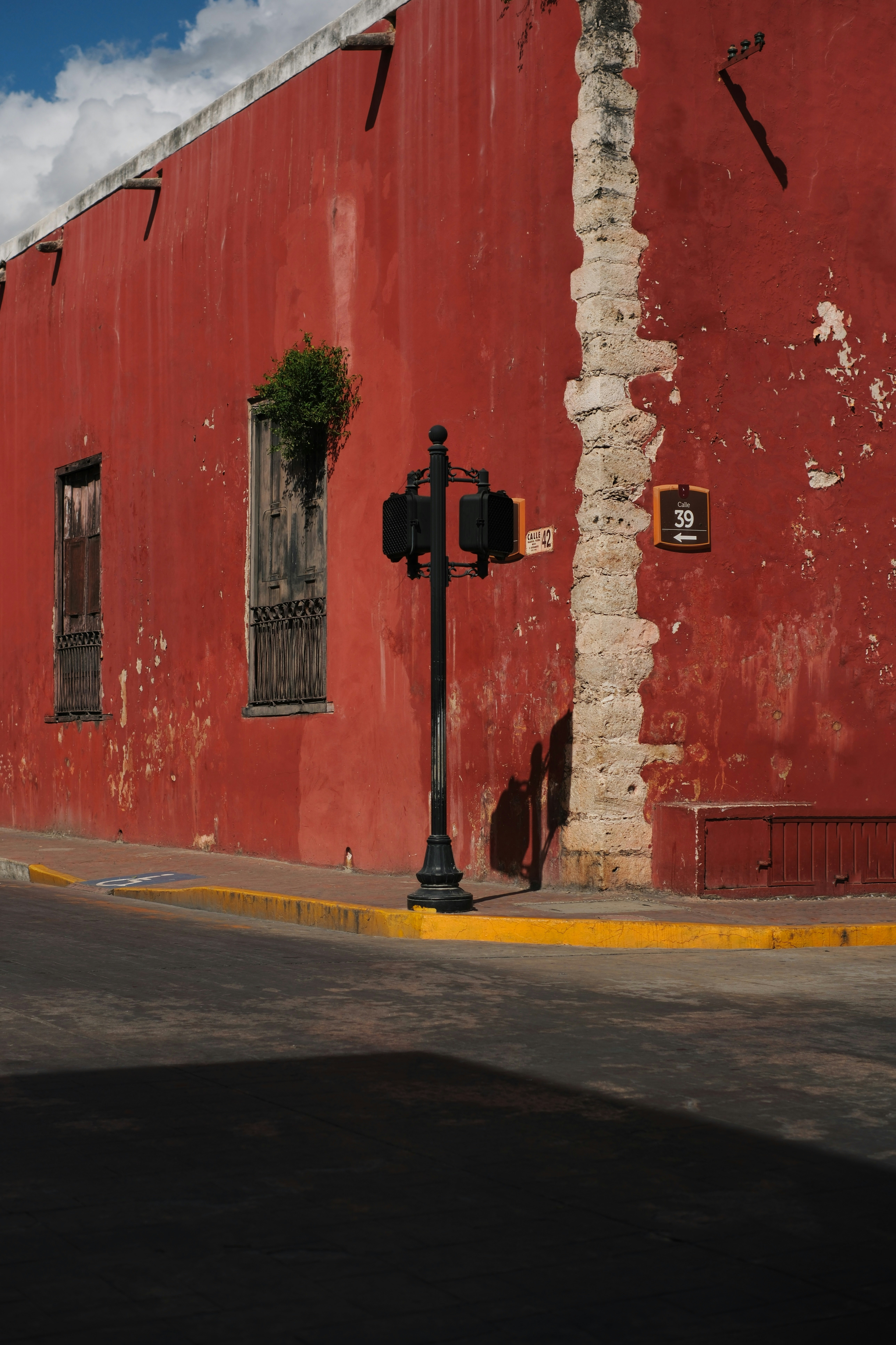 Crimson Wall and Streetlight: Hidden Stories Along a Quiet Corner