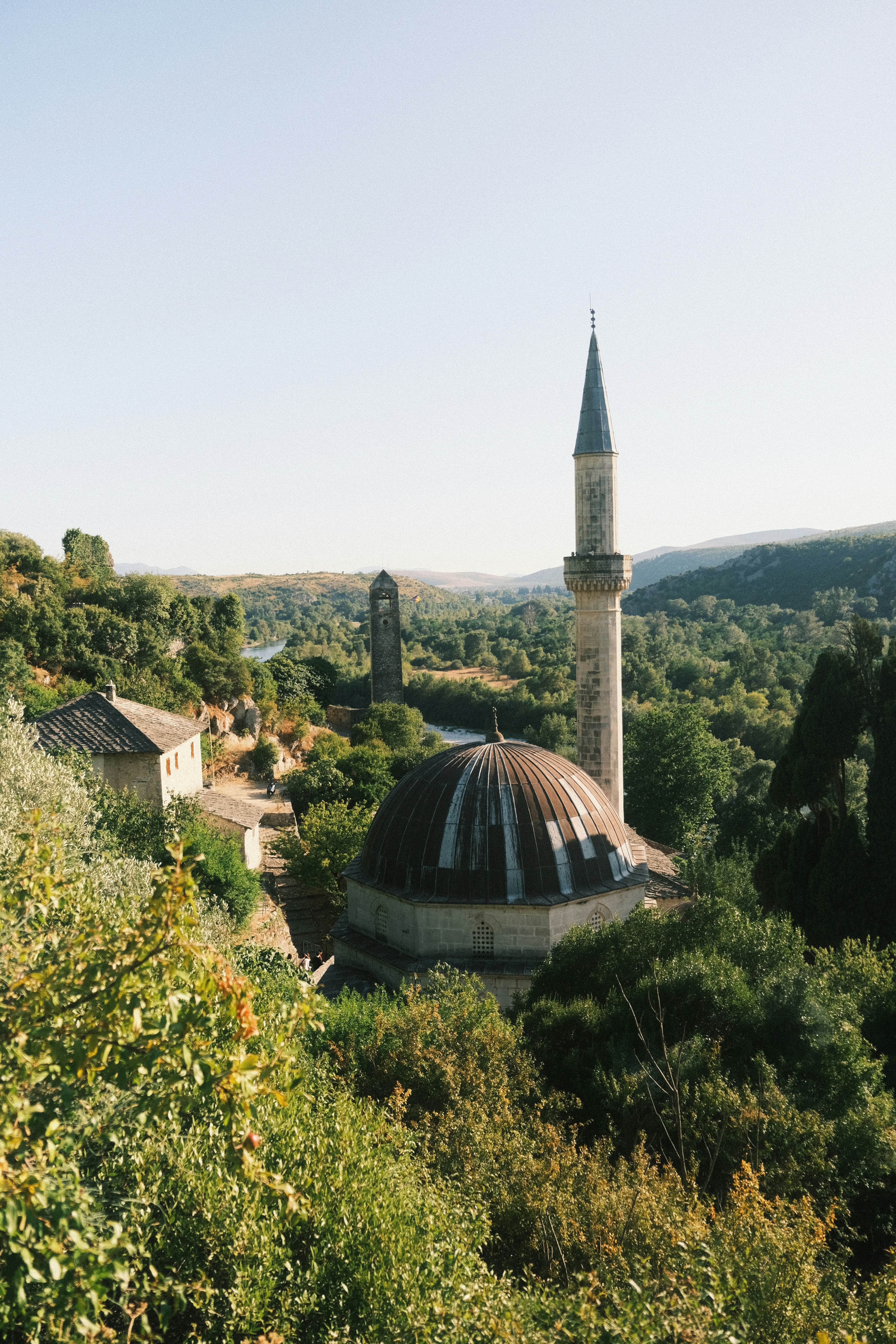 Dome and Minaret Framed by Olive-Green Hills
