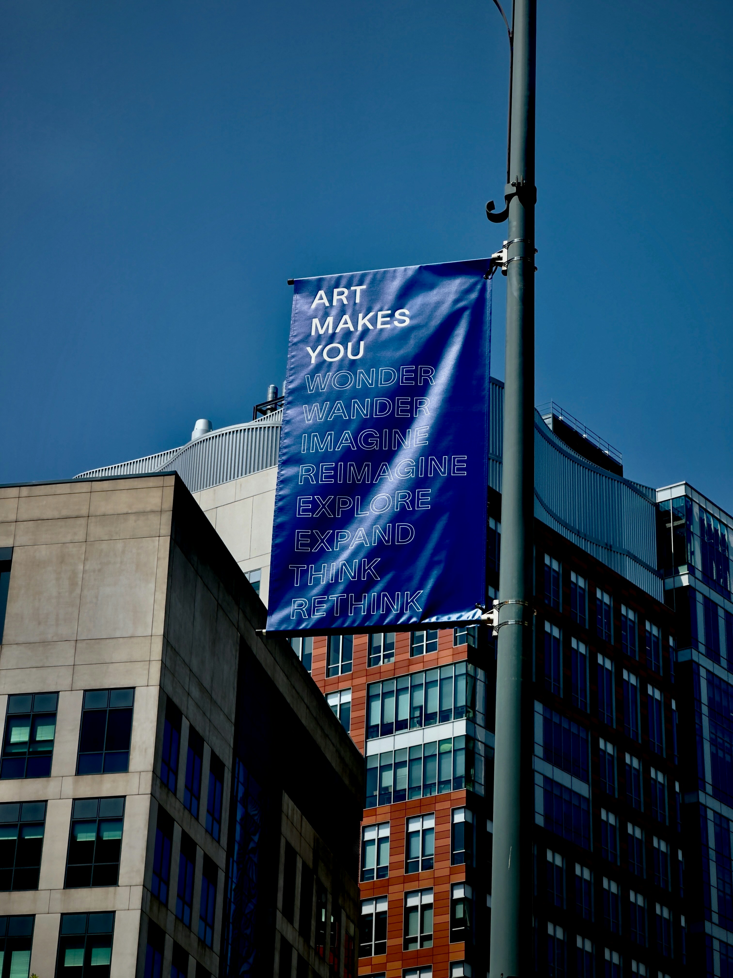 Banner on the City Skyscraper: Words that Spark Wonder