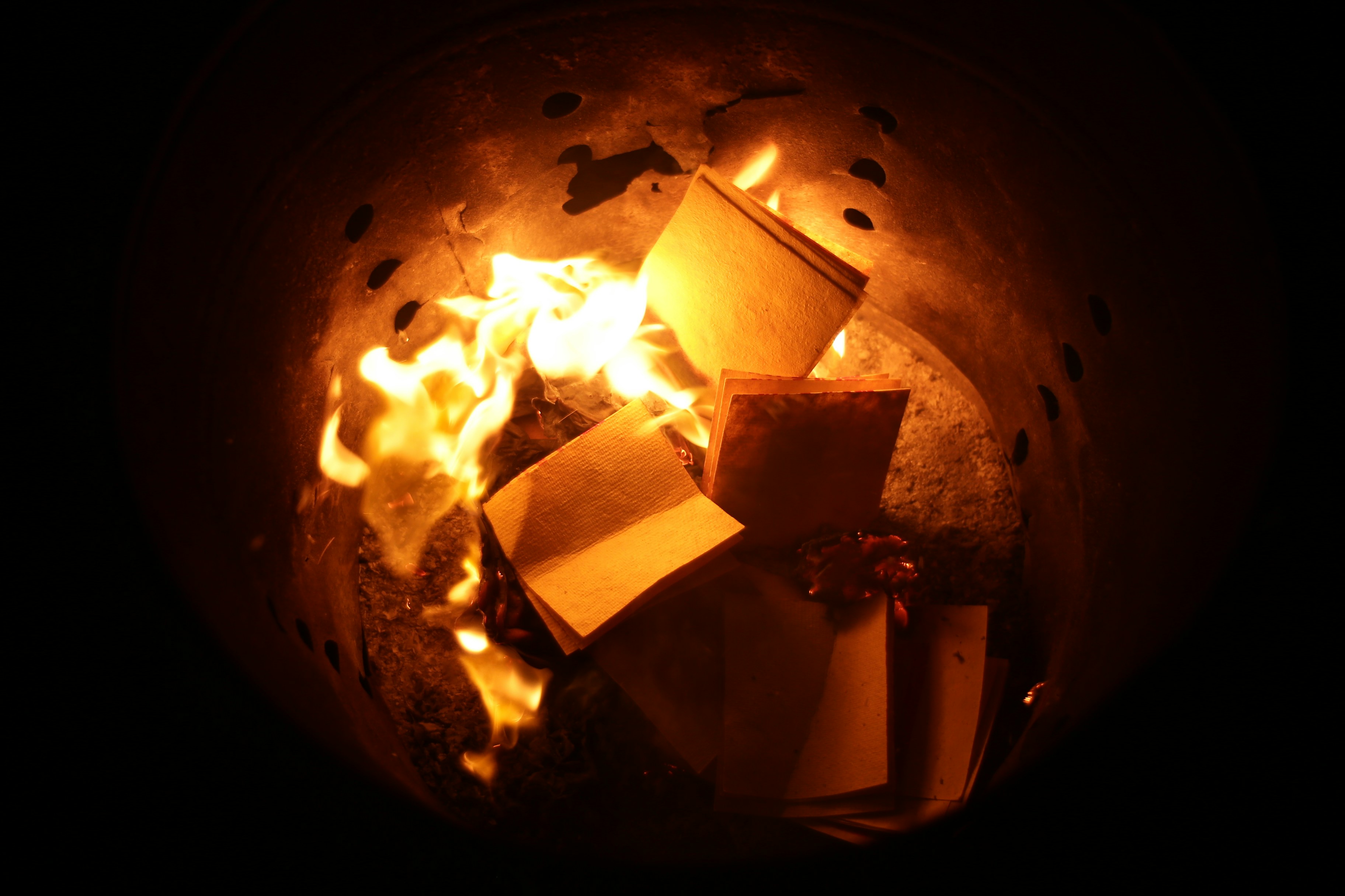 Embers in a Circular Hearth: Cardboard and Blaze