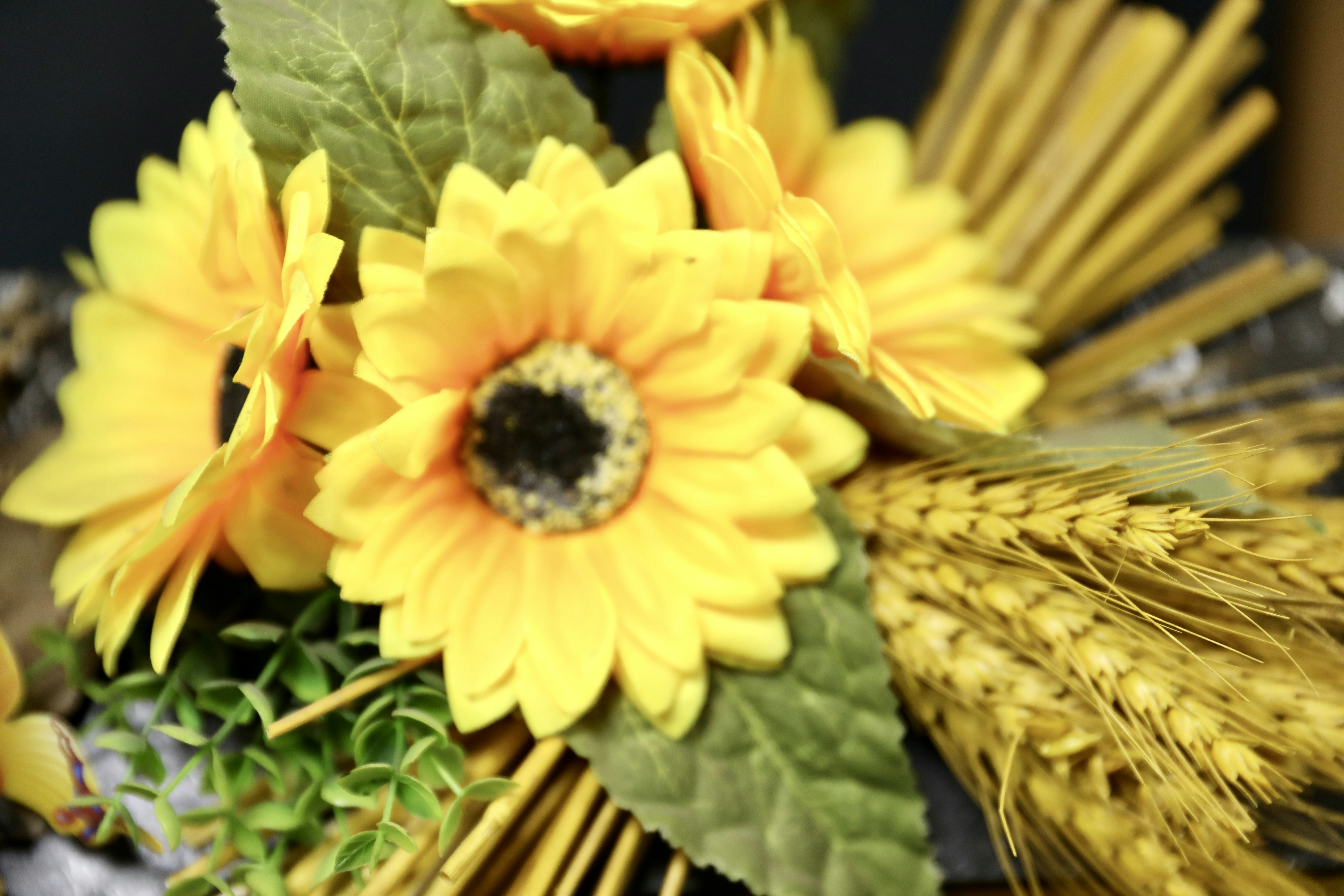 Sunlit Yellow Bloom and Wheat Whorl: A Burst of Summer in the Bouquet