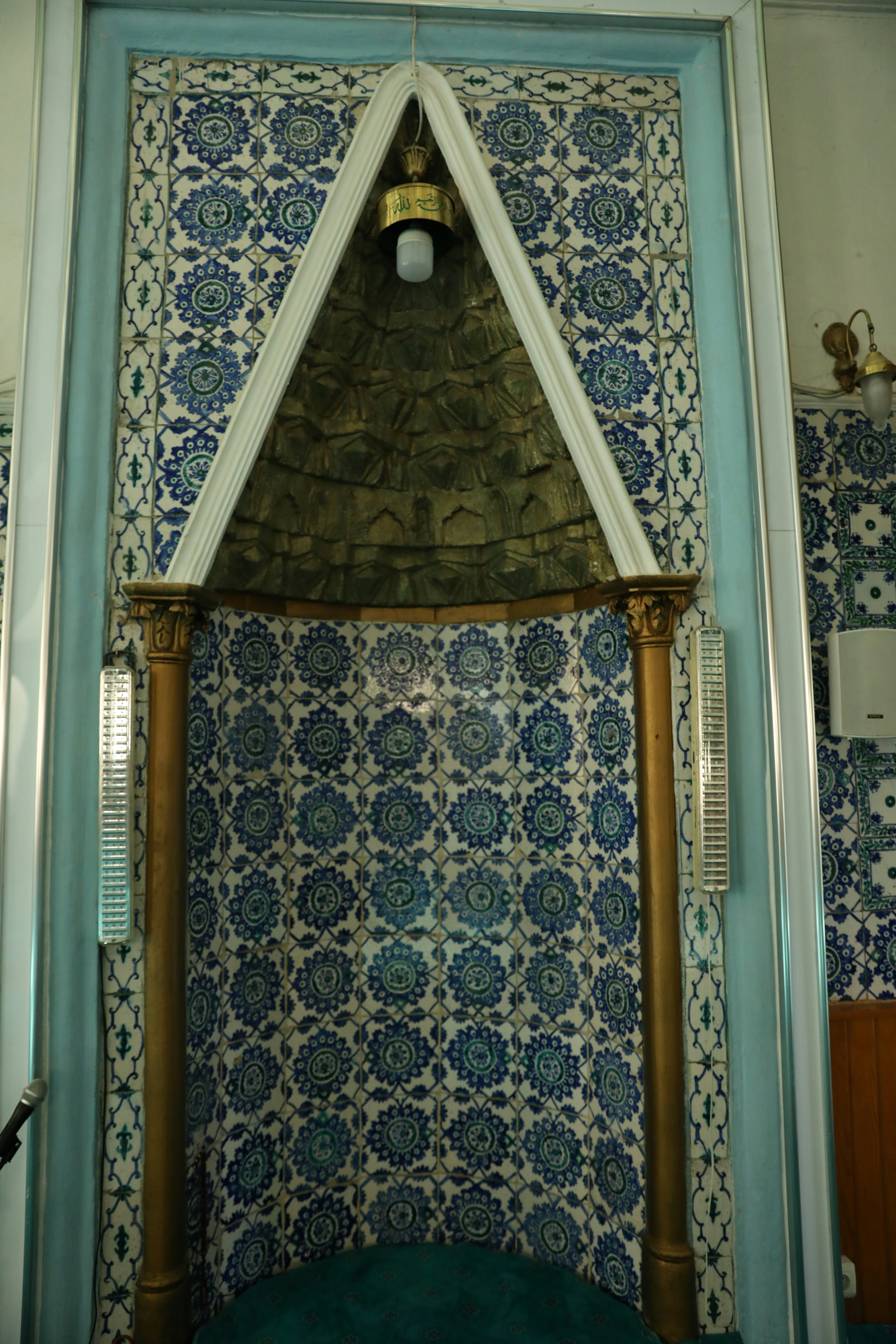 Ornate Turquoise Tile Niche with a Draped Triangular Frame