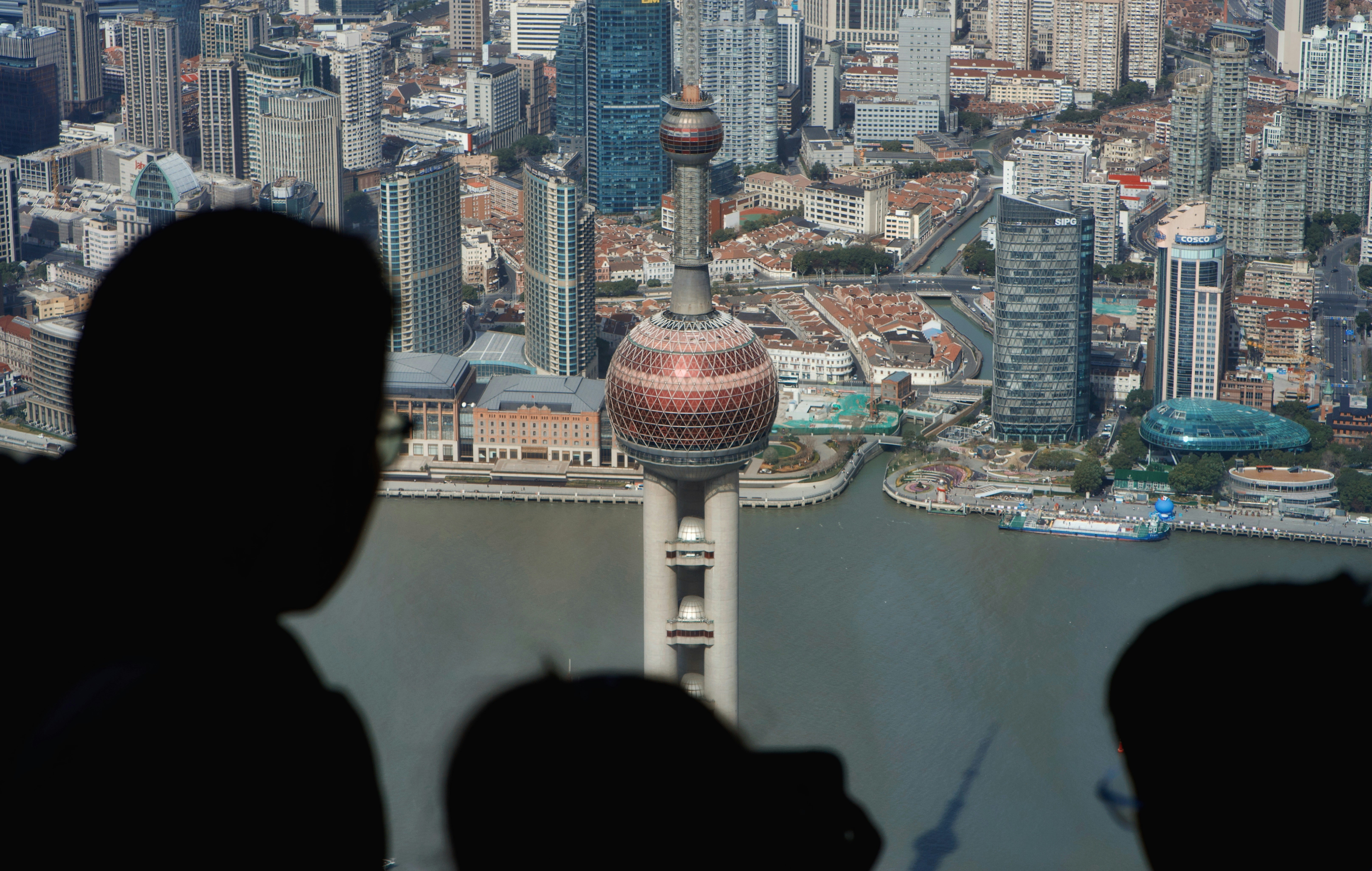 Overlook from the Glass: The Pearl Tower and Shanghai Skyline