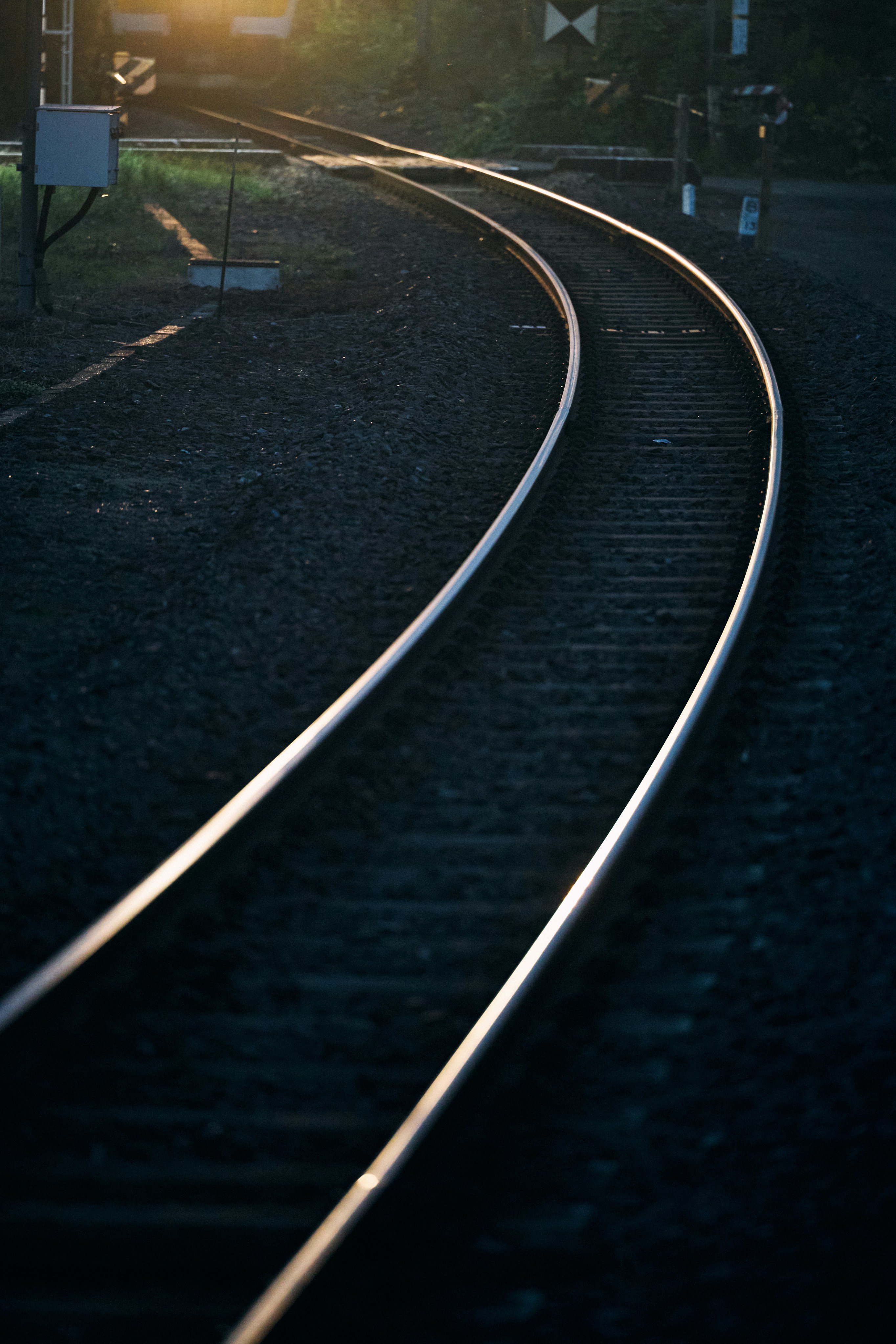 Curving Rails at Dusk: A Quiet Convergence of Steel