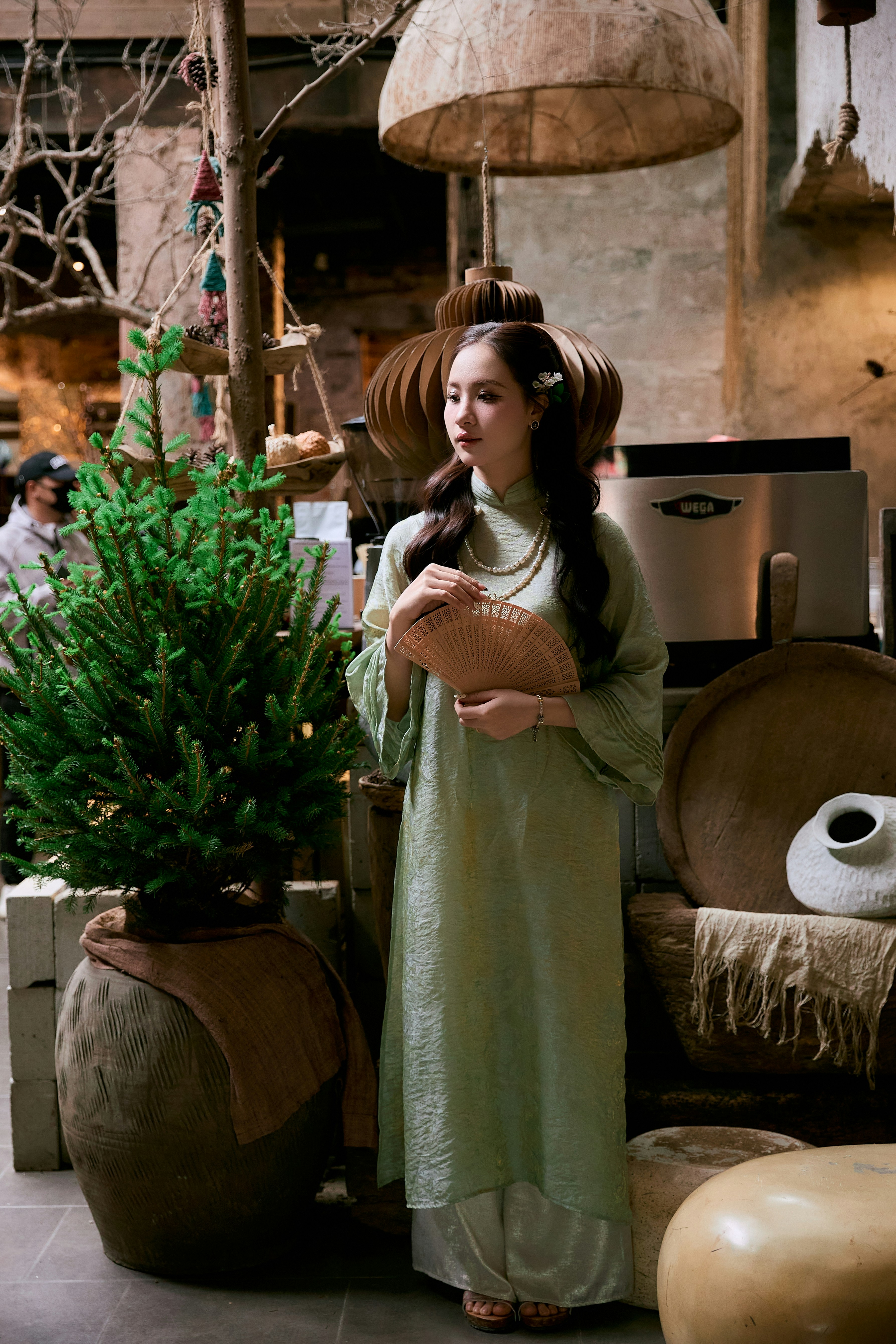 Silk-green Gown in a Vintage Atelier