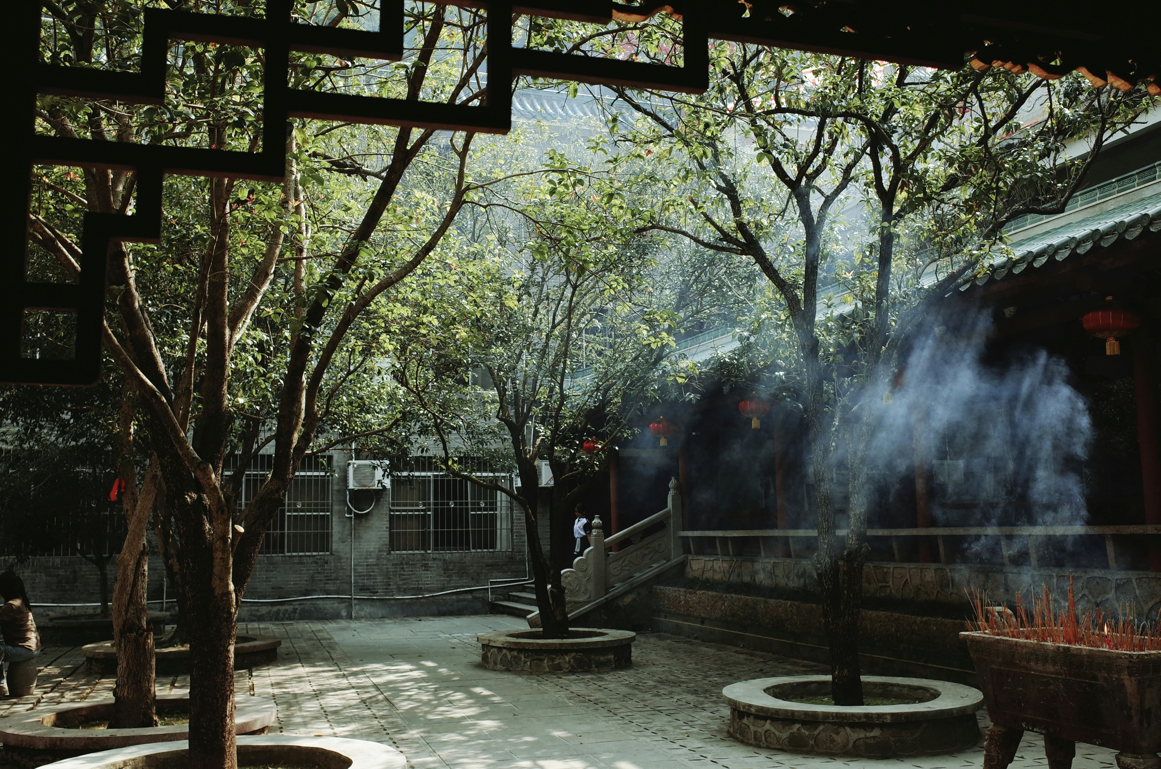 Quiet Courtyard Echoes: Smoke, Shadows, and Stone