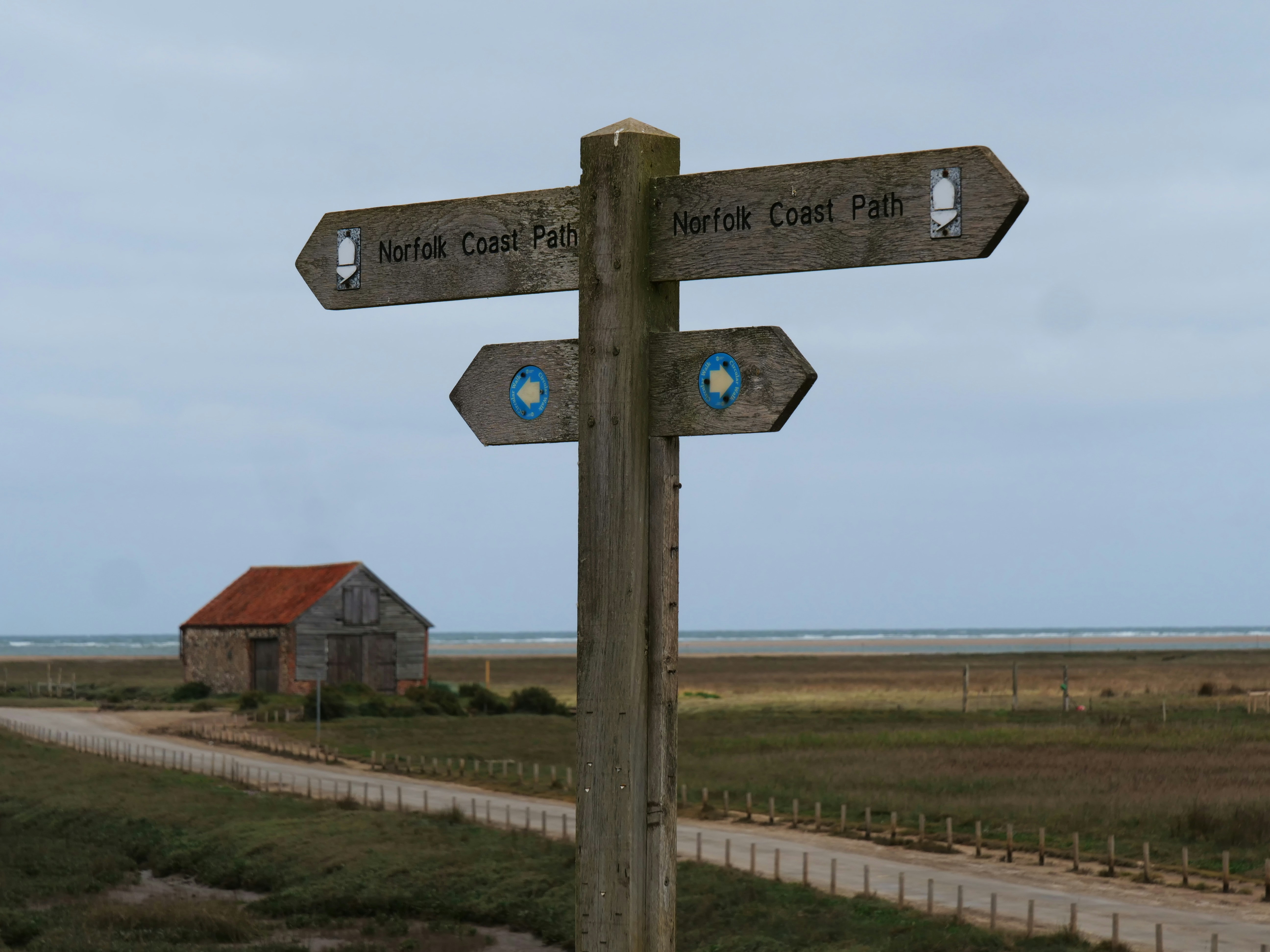 Lonely Norfolk Coastal Path Signpost at Distant Shack