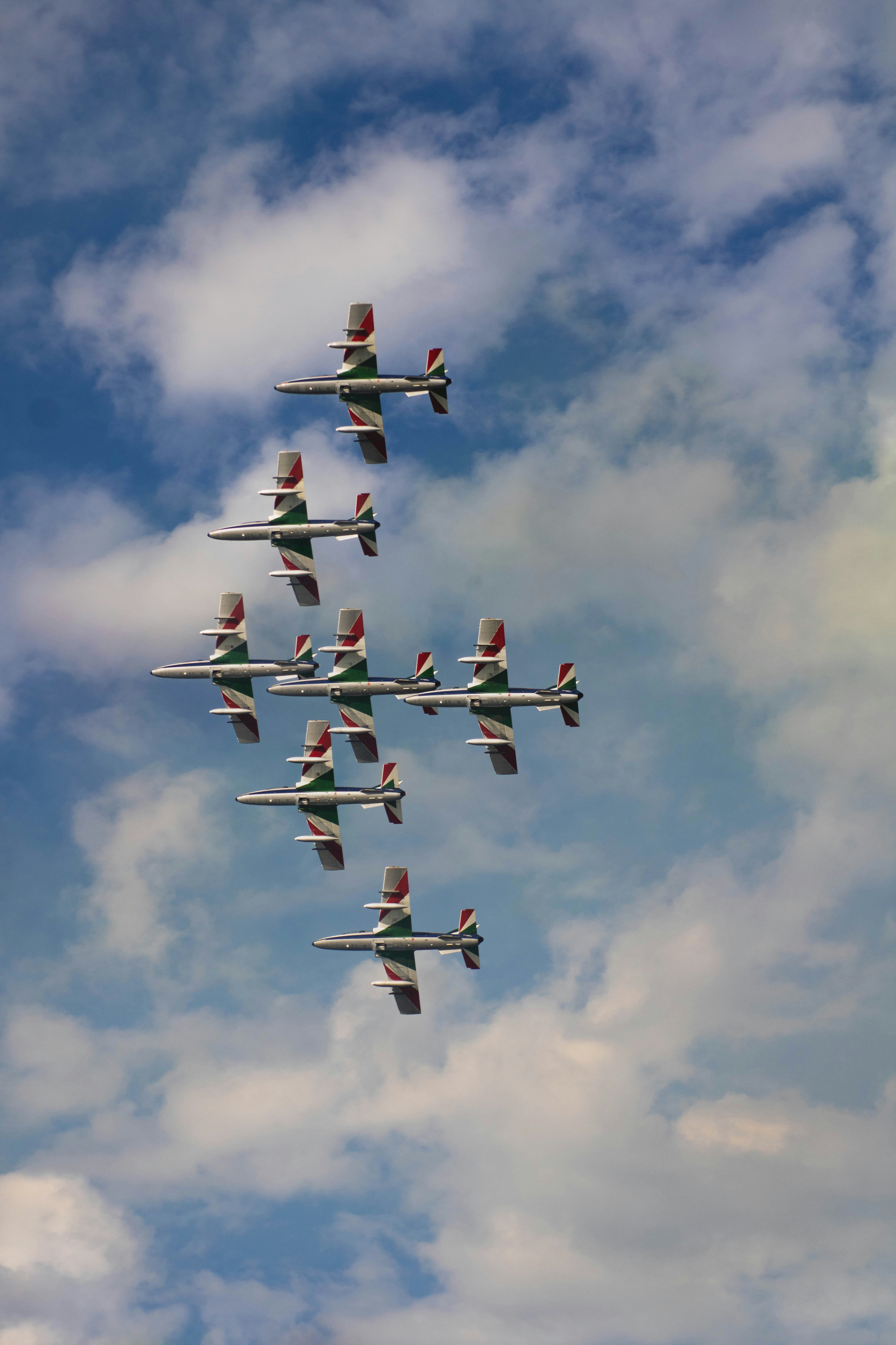 Nine-Plane Formation Piercing Through Sky