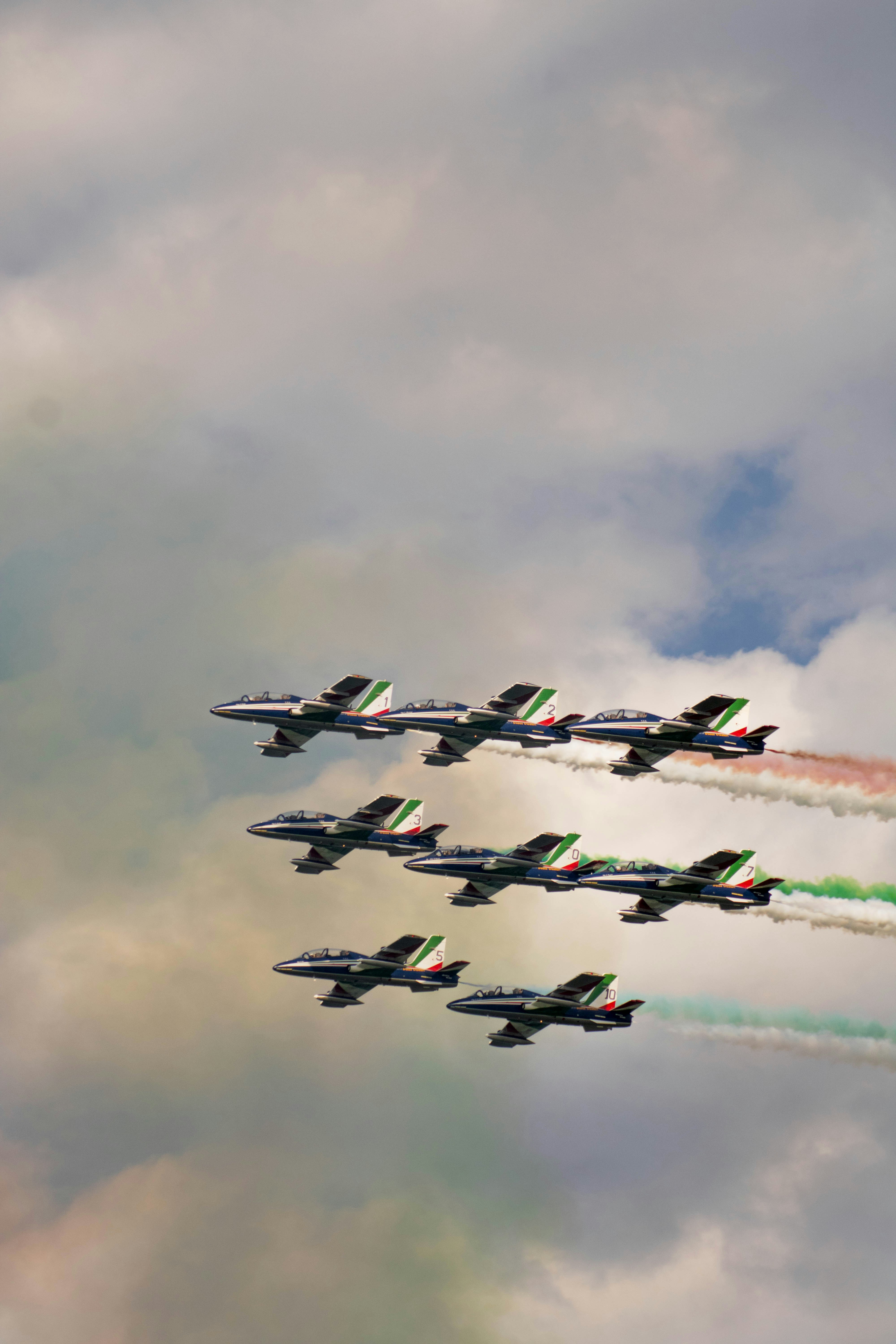 Colorful V-formation: Jets Carve Lines Through Cerulean Sky