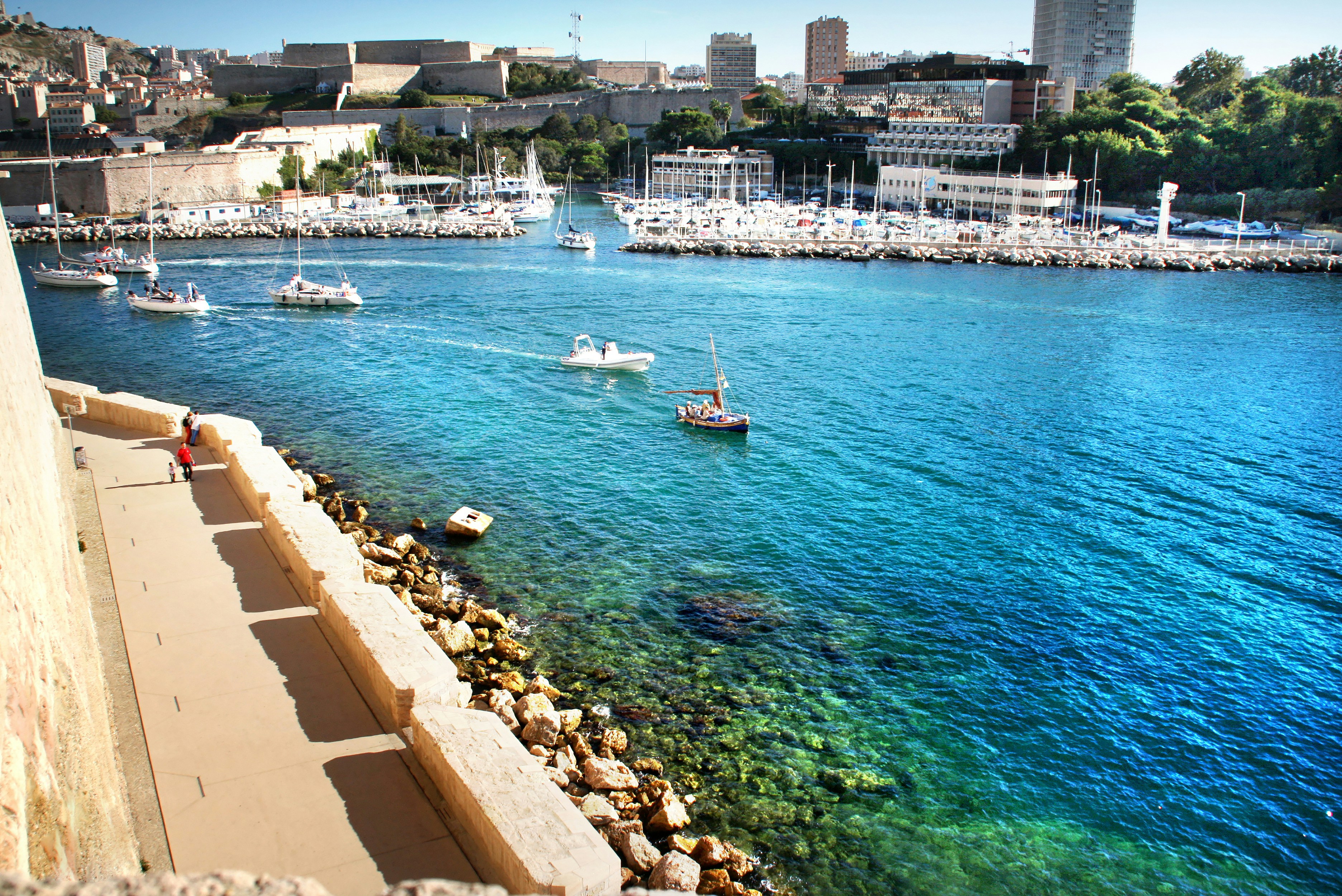 Harbor Glow: A Sunlit Coastal Walk By the Stones
