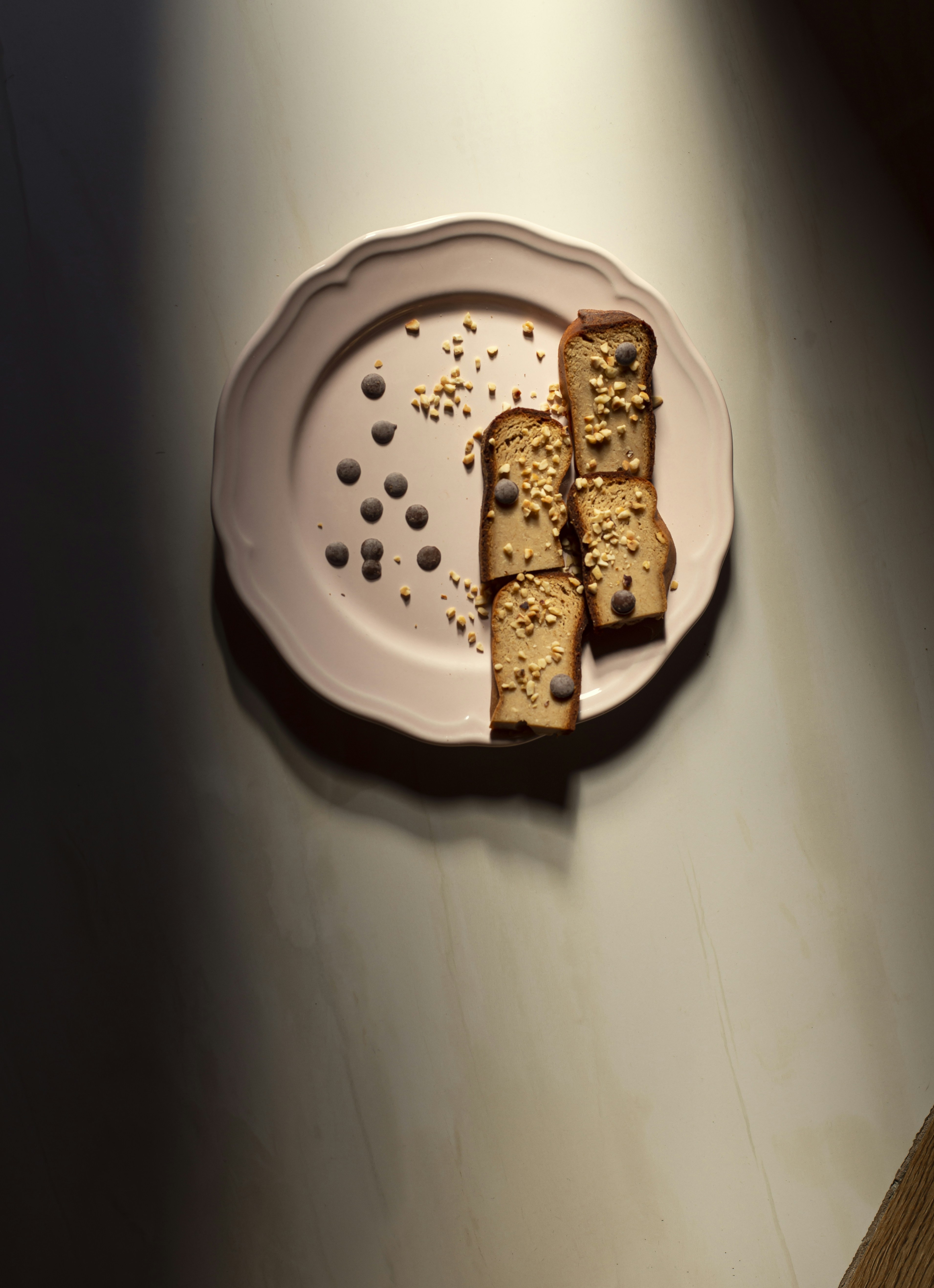 Nibbling Night Snack: Chocolate Tiles on a Pink Plate