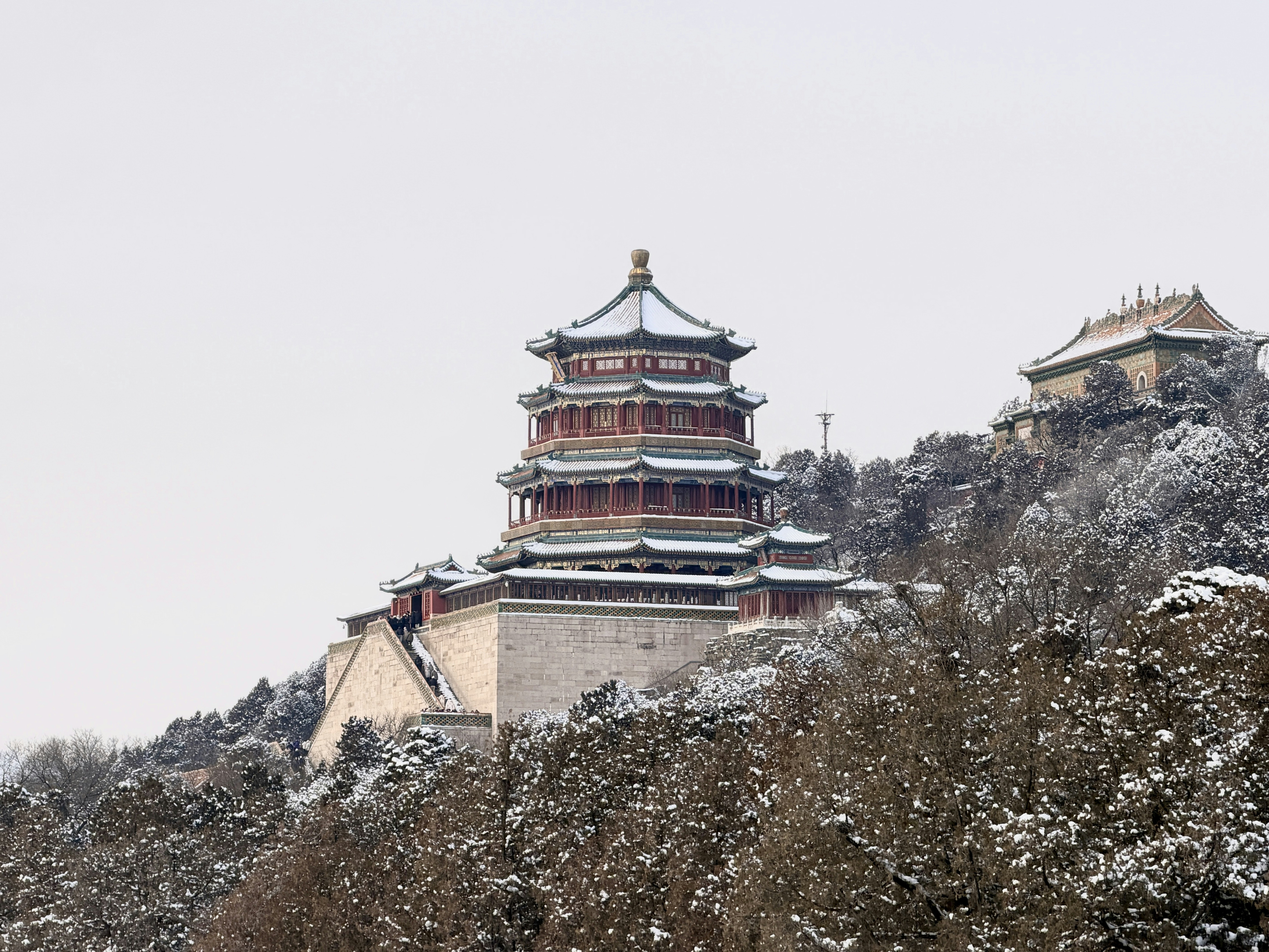 Snow-blanketed Pagoda Overlooking a Historic Terrace