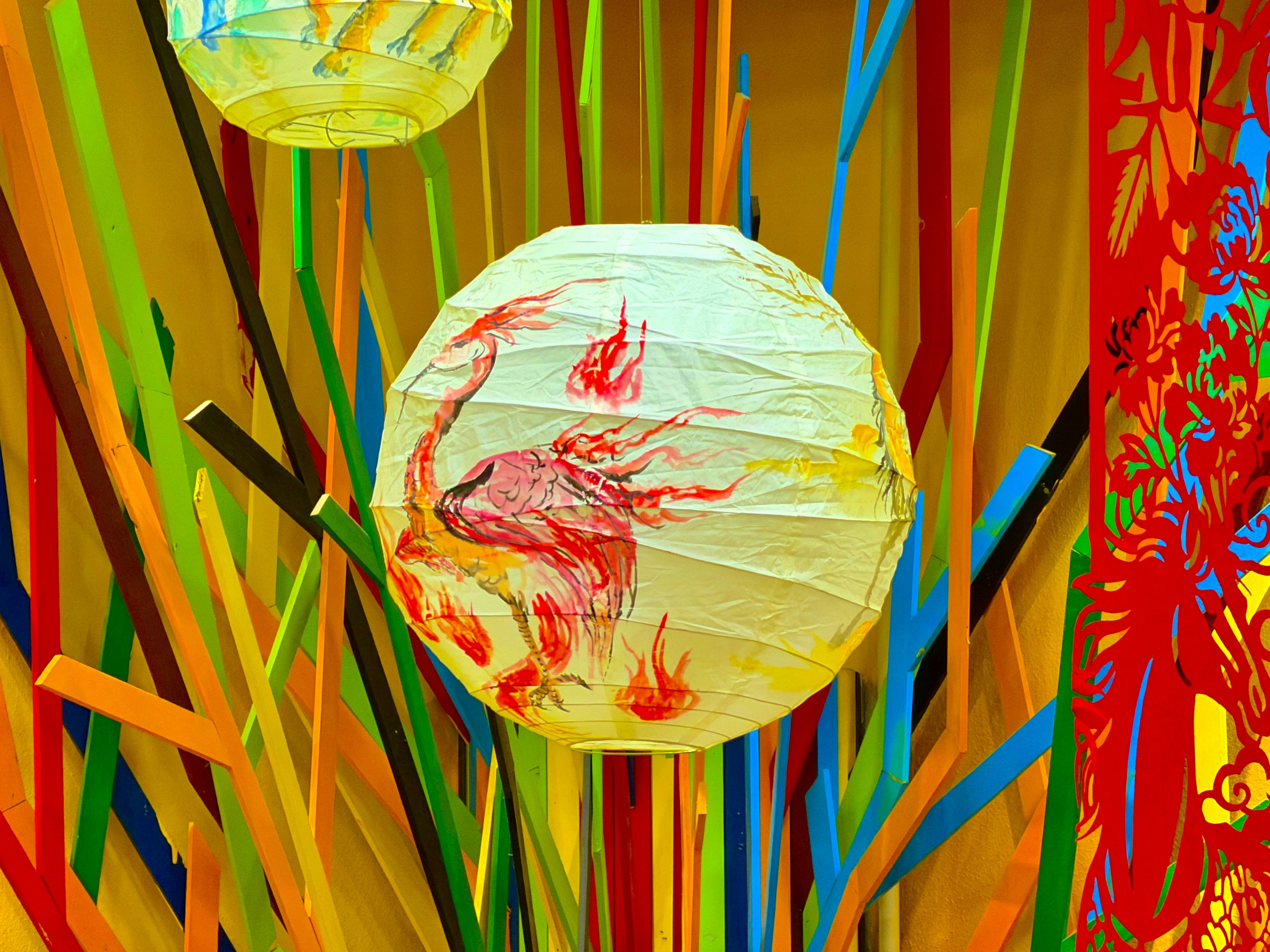 Lanterns Among Stems: A Burst of Color