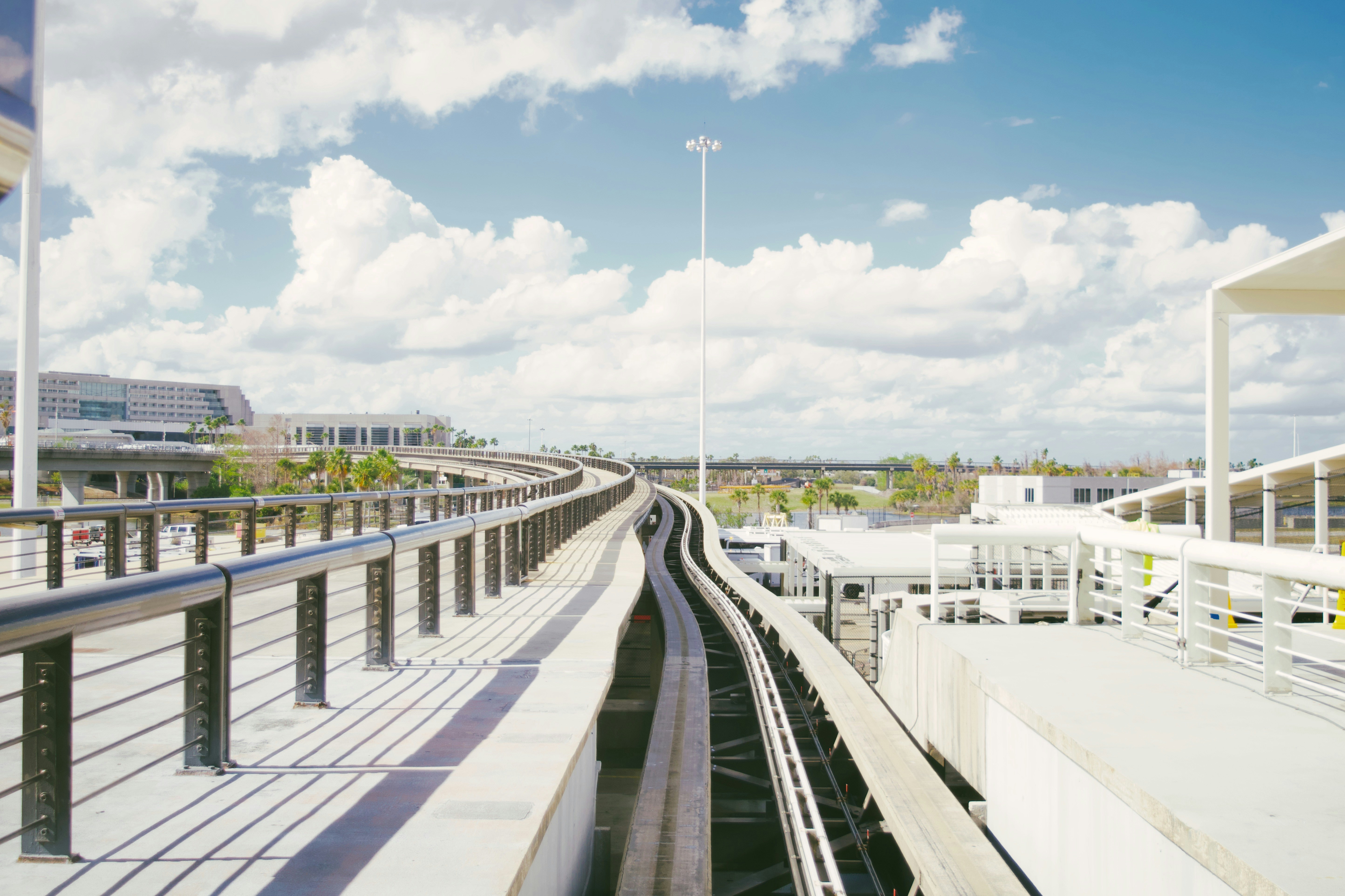Curved Rails under a Bright Sky