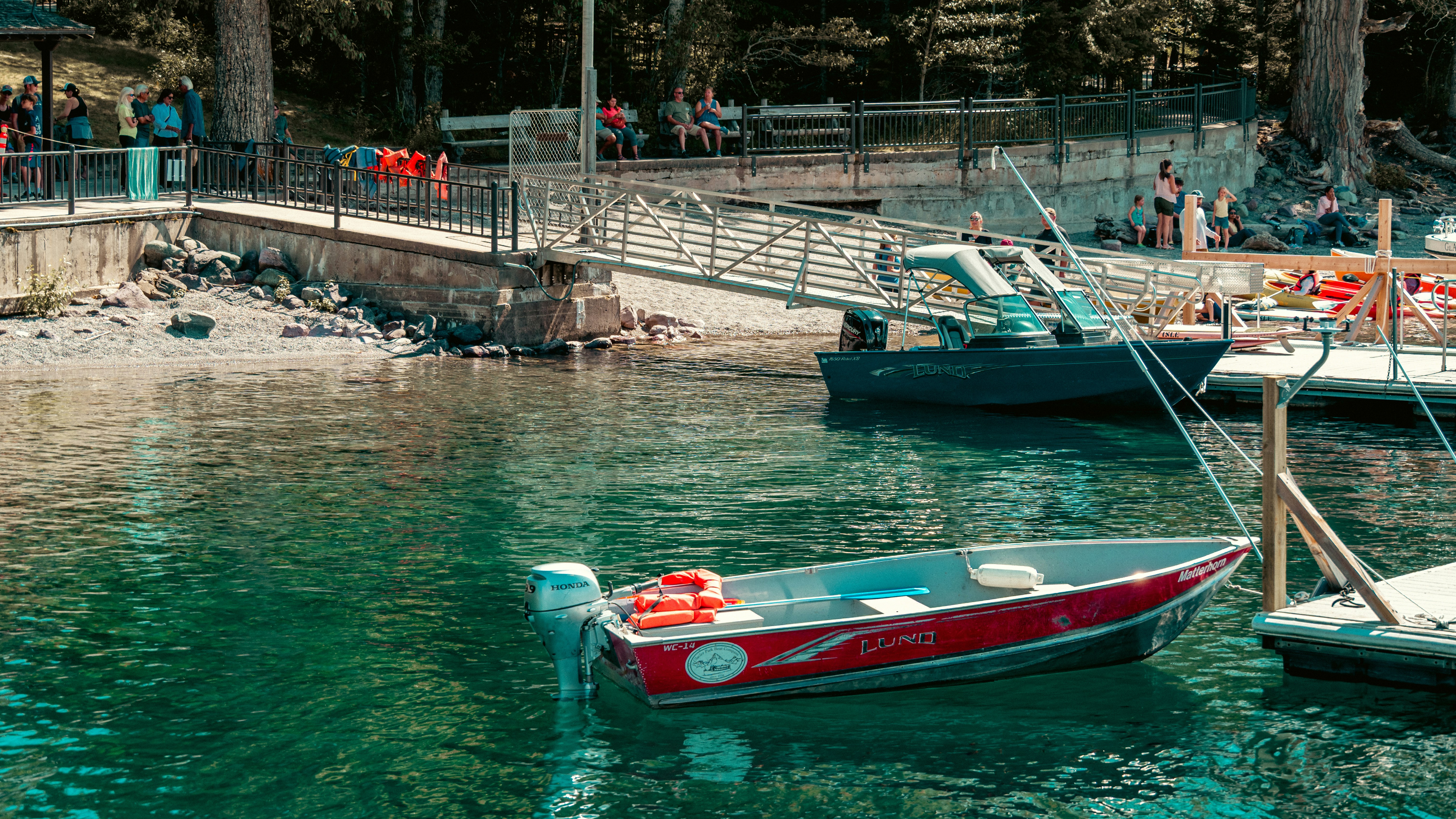 Emerald Harbor: Crimson Boat at the Quiet Dock