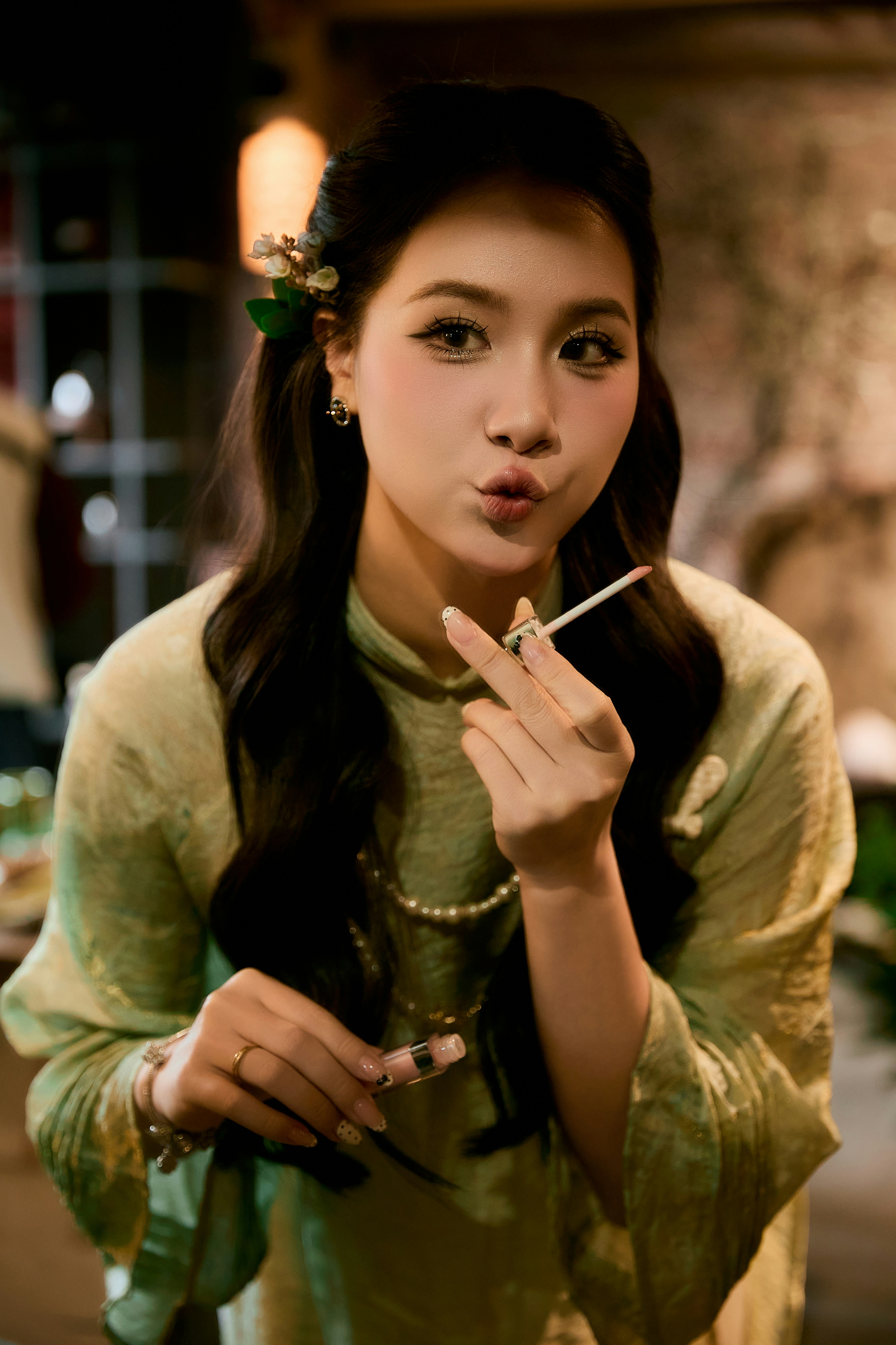 Feathered Smile: A Quiet Moment with a Smoky Green Muse