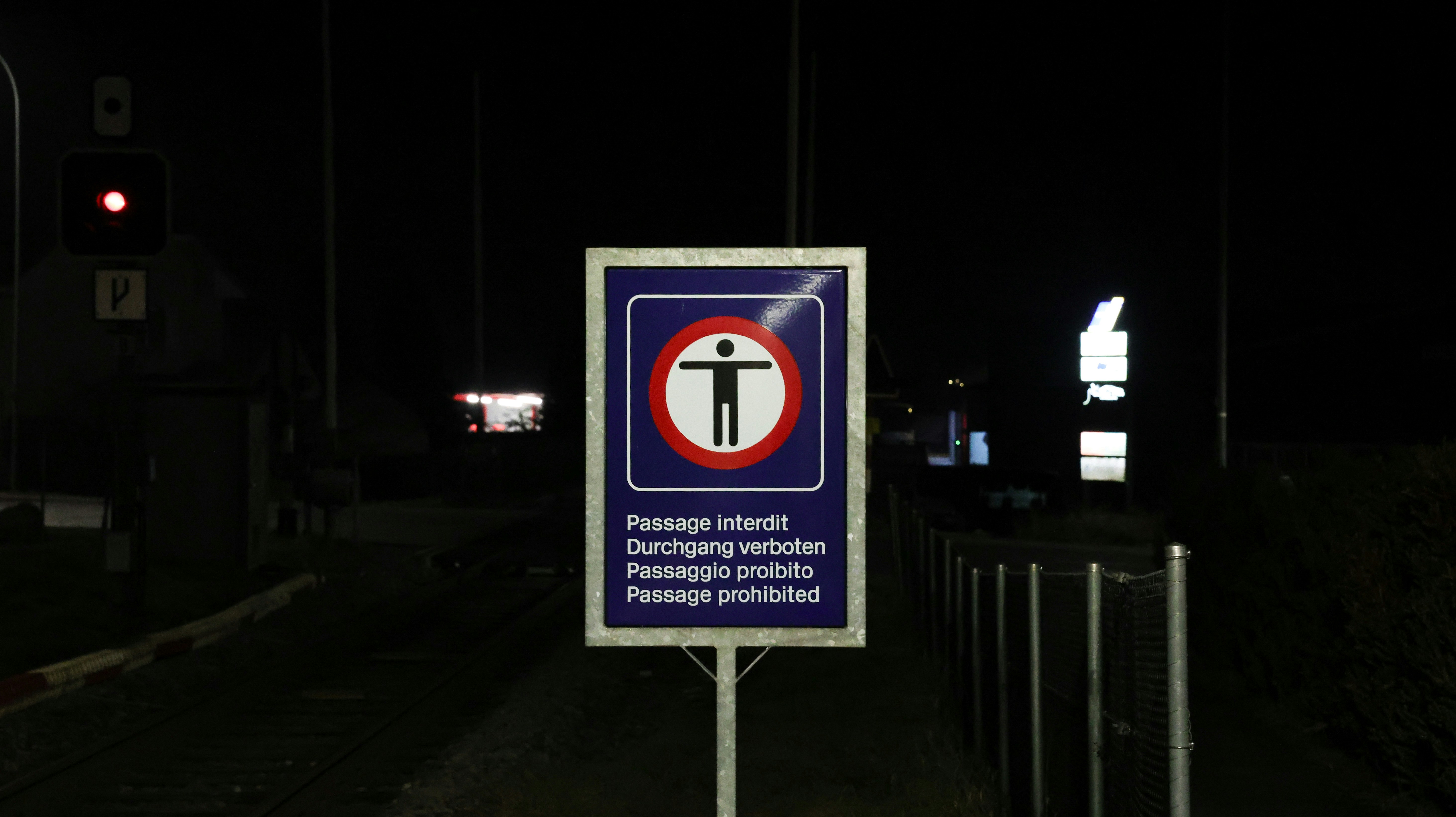 Night Signpost: Forbidden Passage Under Dim Streetlight