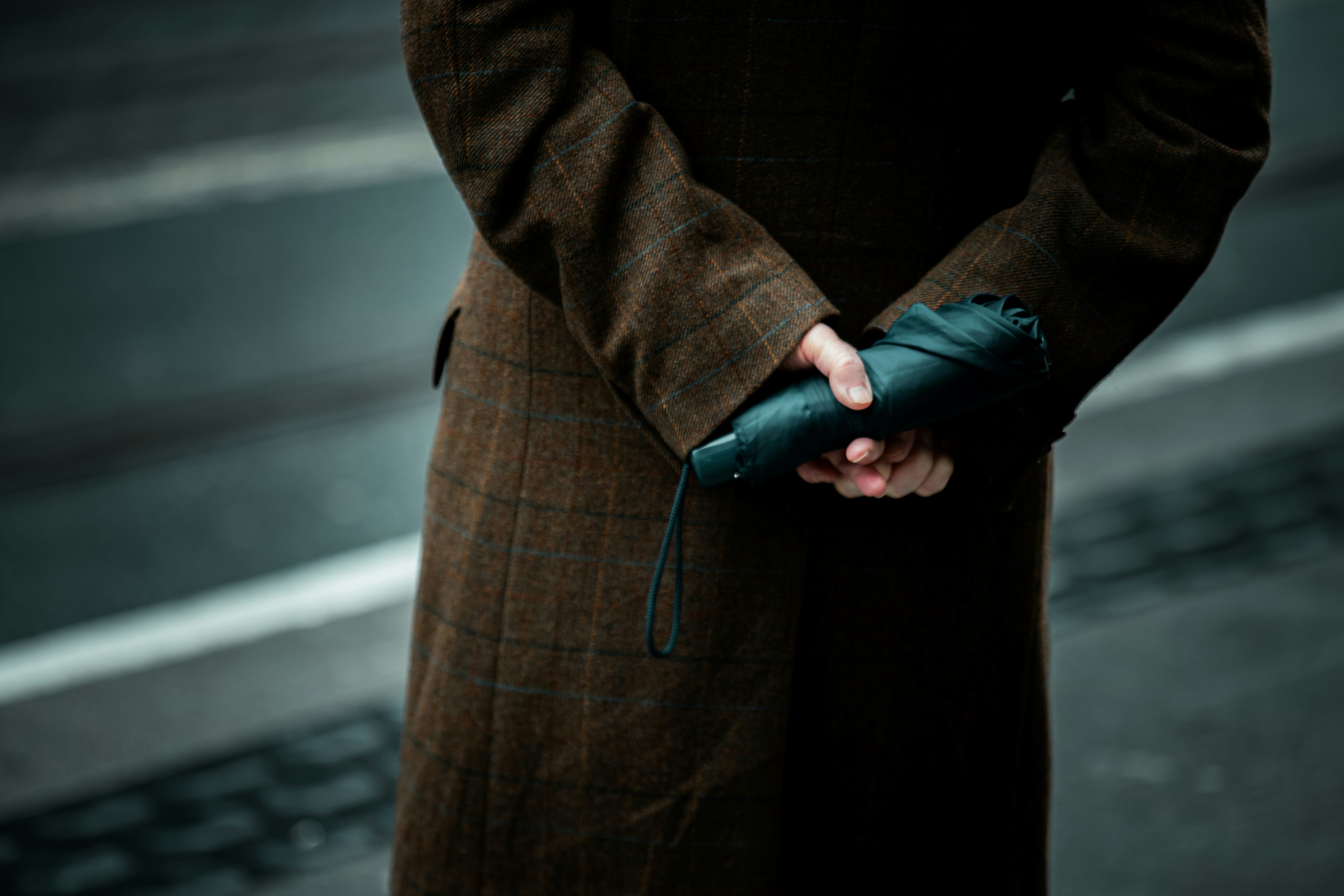 Cozy Overcoat, Hidden Confidence: A Handful of Umbrella Grips