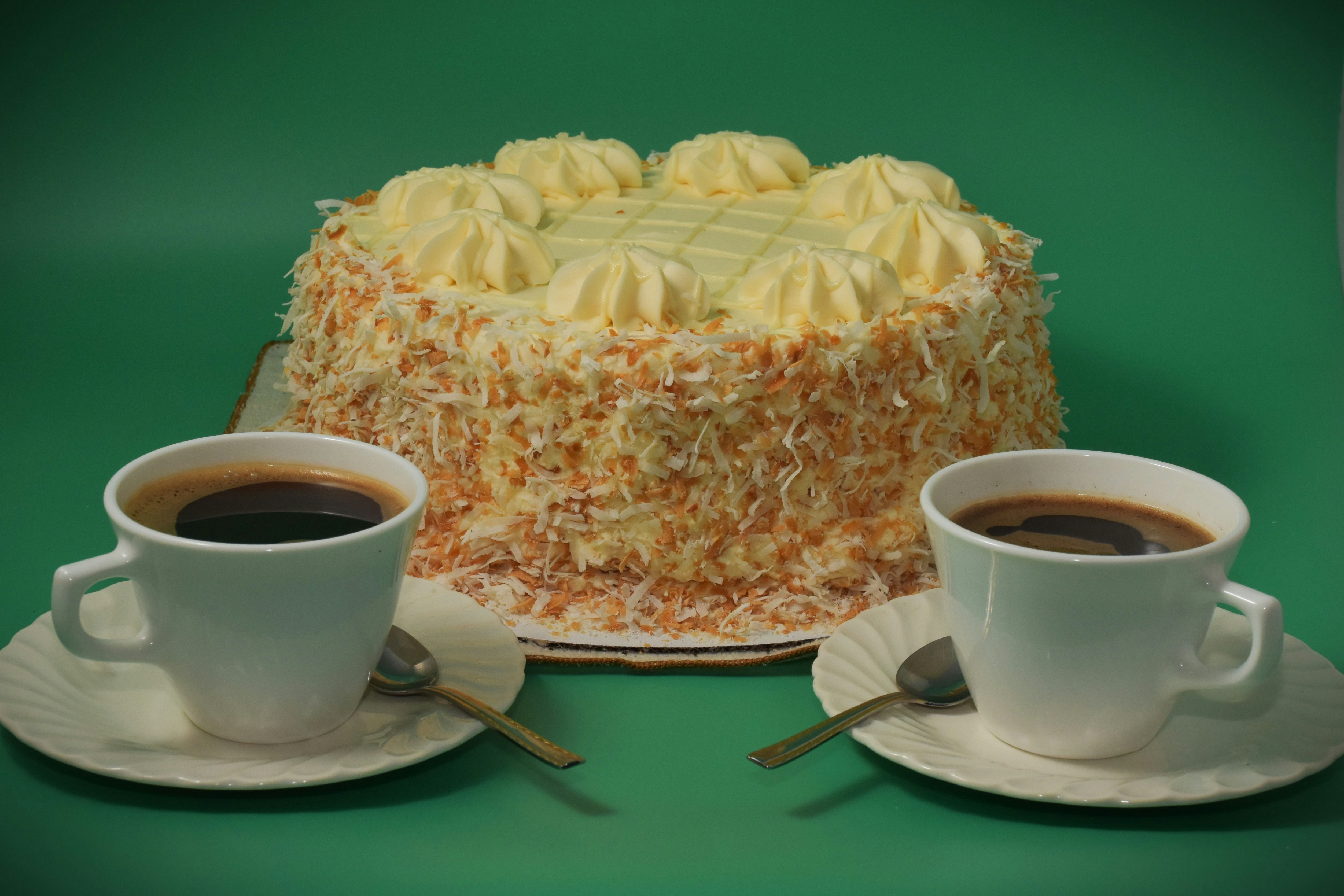 Cream-Lace Celebration: A Double-Tea Cake Framed by Two Cups