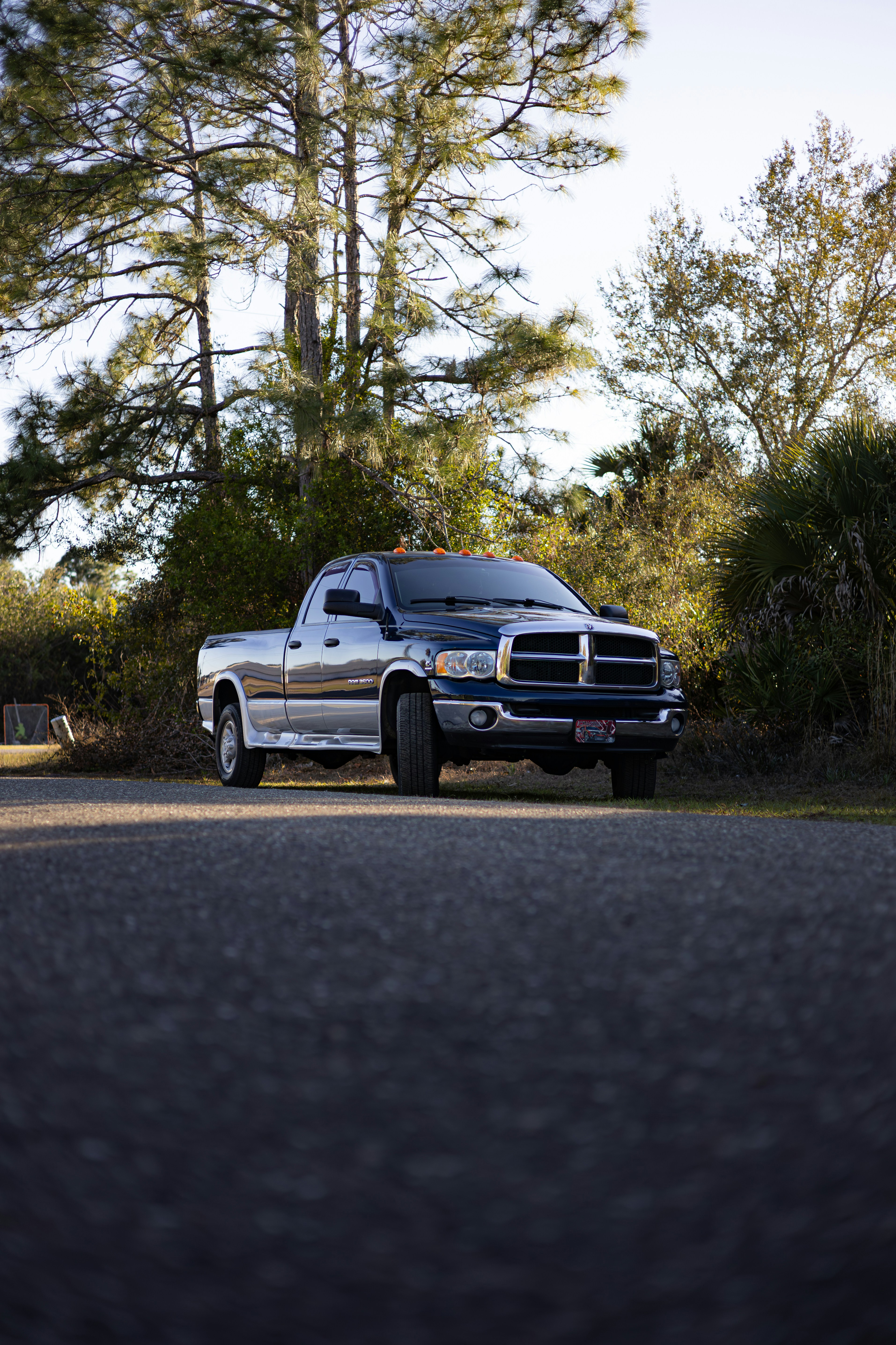 Chrome-Trimmed Pickup Under Sunset Sky