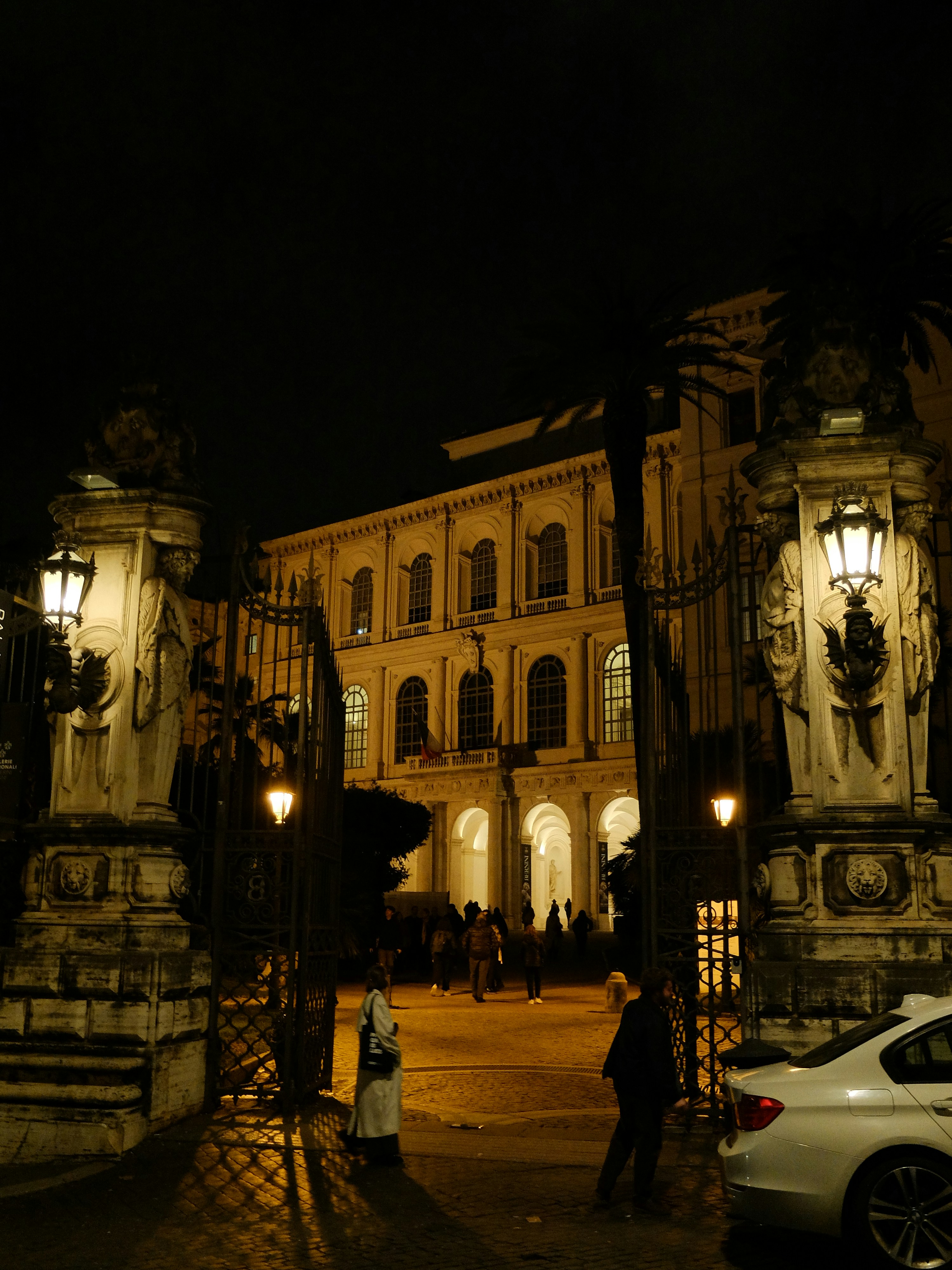 Gatehouse at Night: Warm Glow and Silent Courtyard