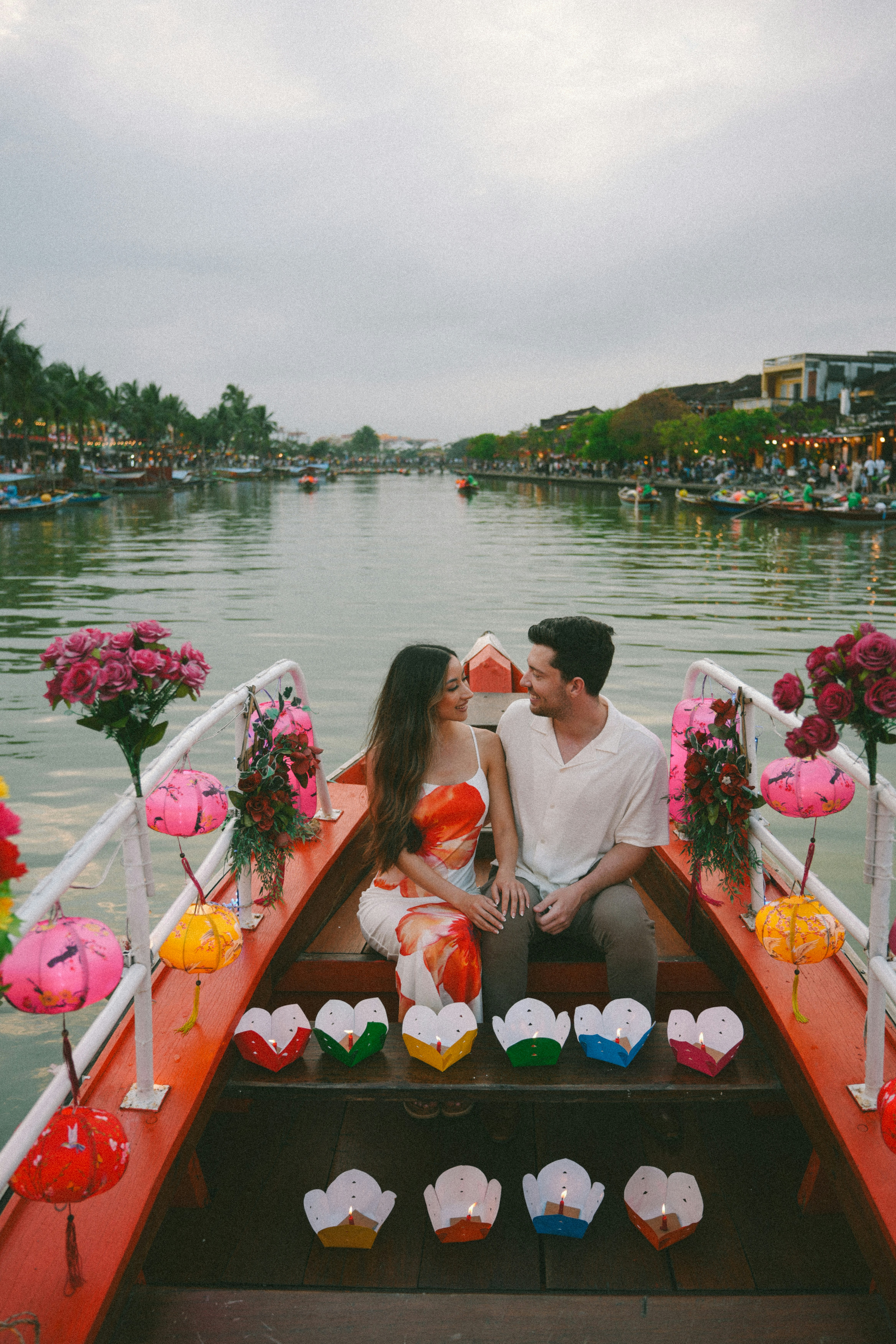 Sunlit Boatkiss on a Colorful River Voyage