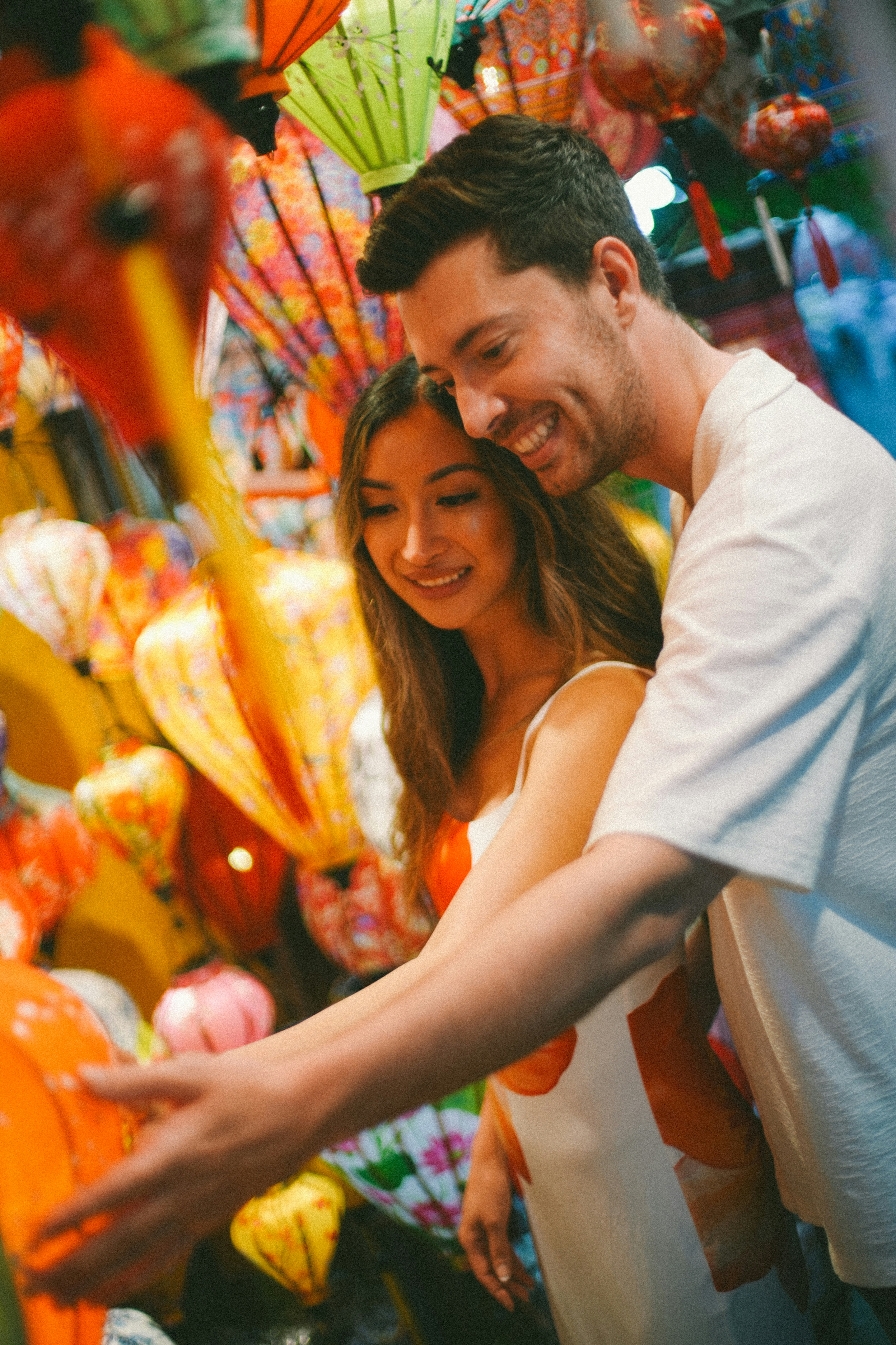 Joyful Moment Amid Colorful Lanterns