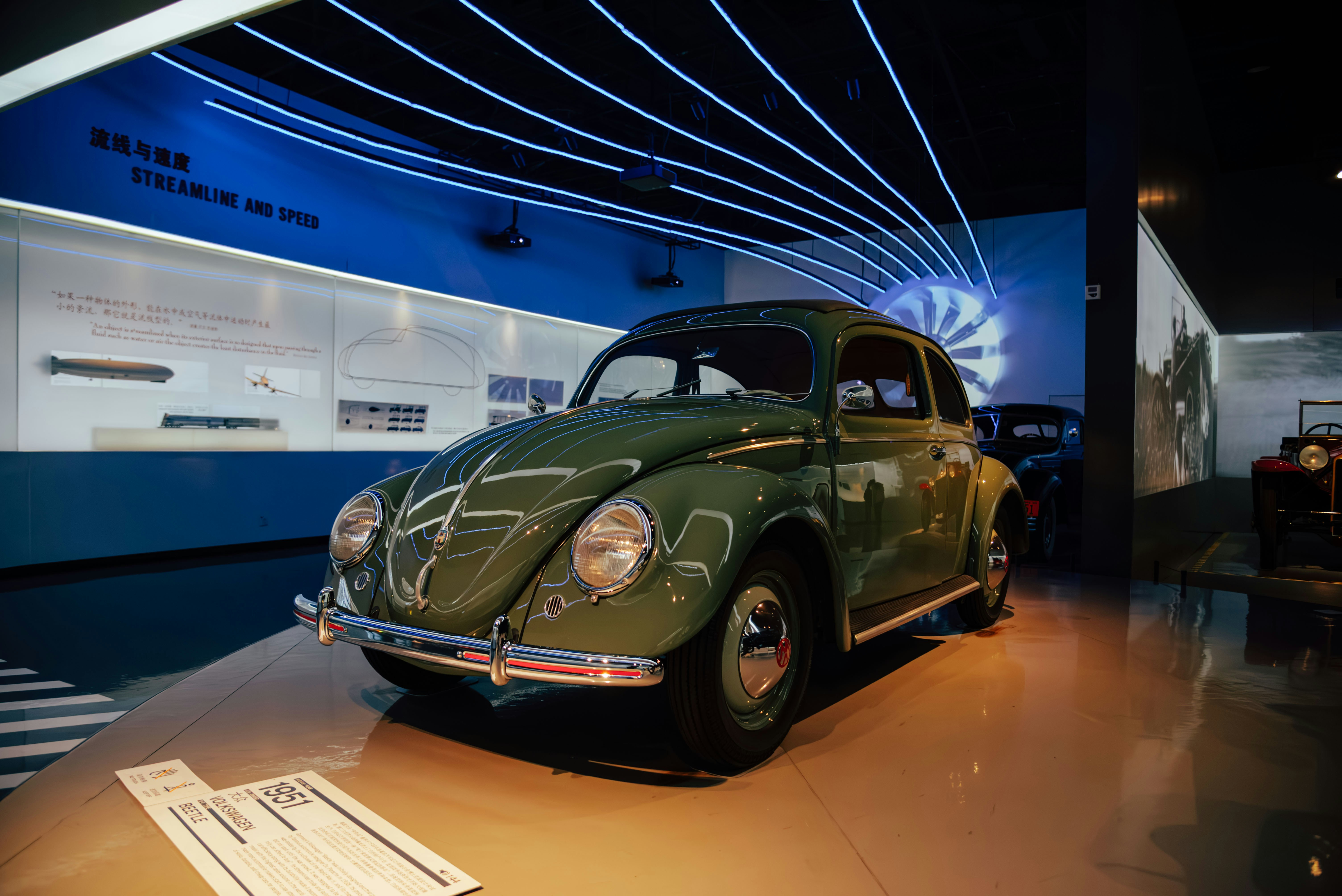 Vintage green volkswagen beetle on display