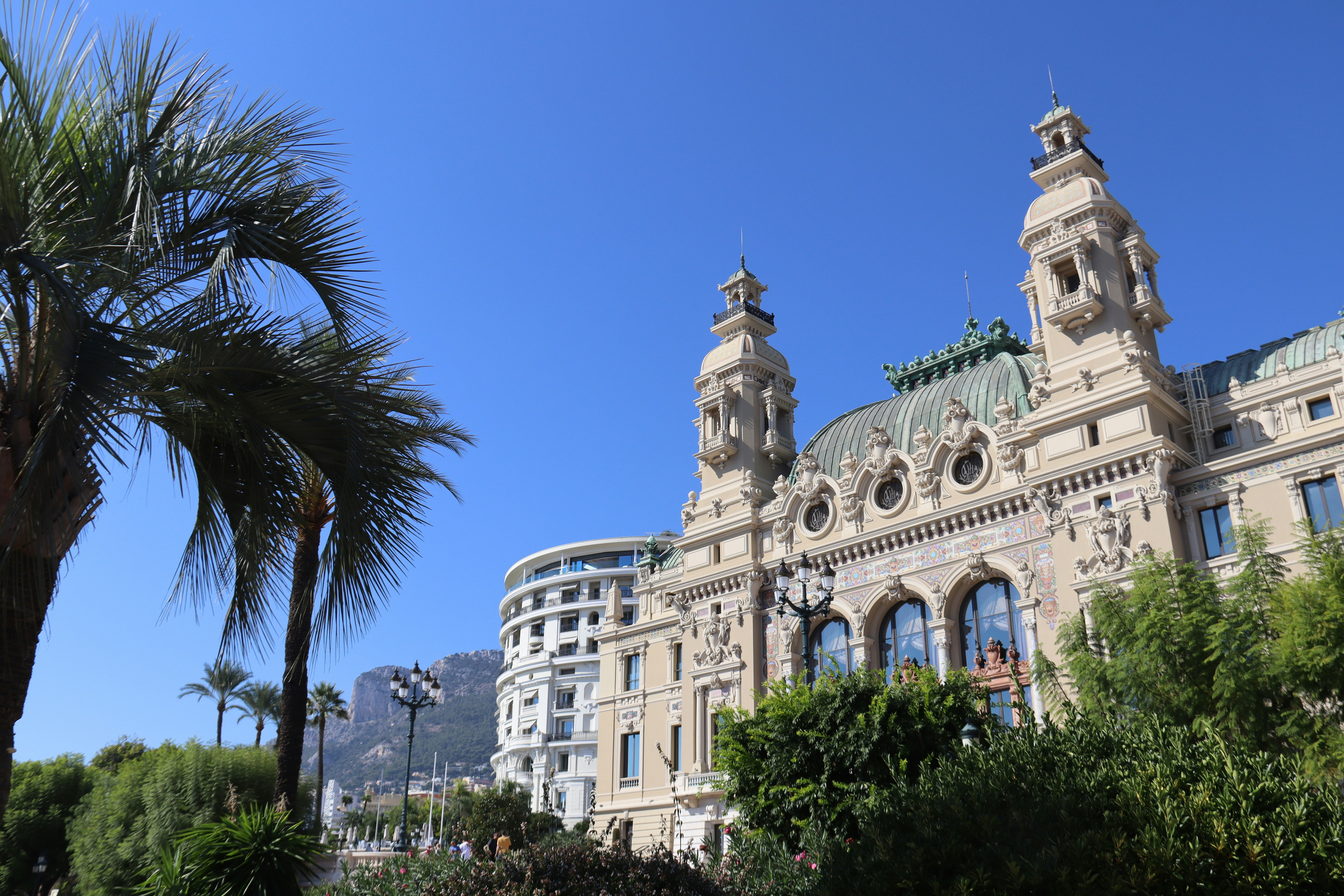 Ornate Maritime-Style Building Rising Above Sunny Promenade