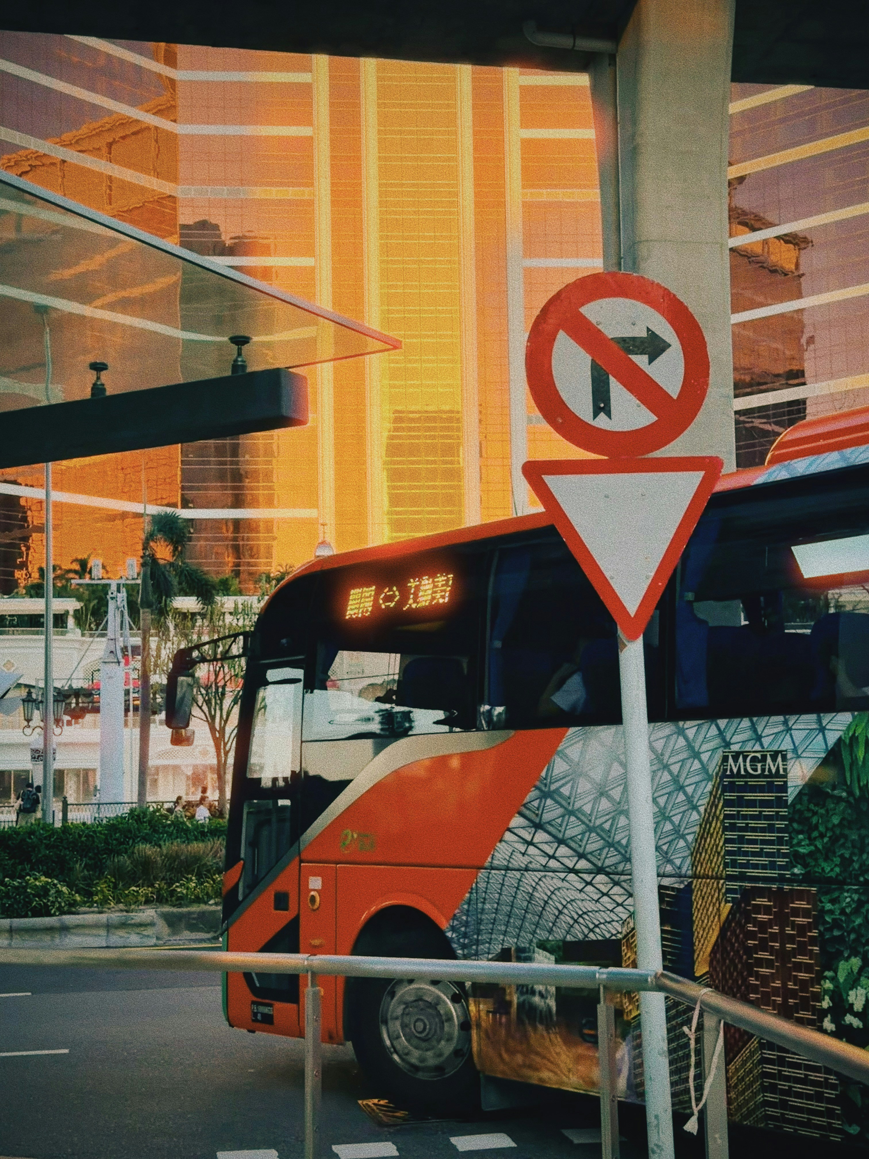 Urban Bus and Neon City Reflections