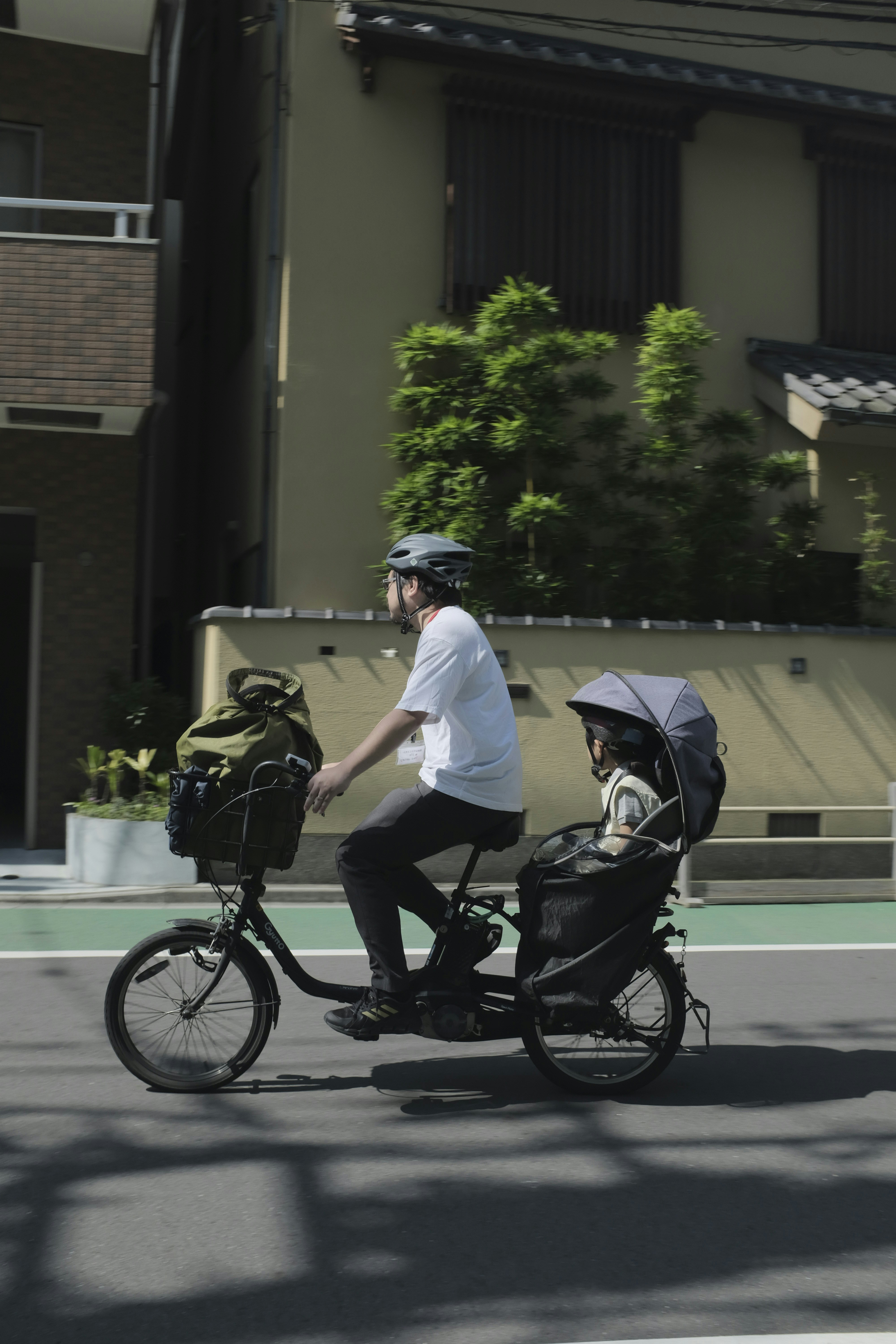Pedal Power: A Father and Child on a Quiet City Ride