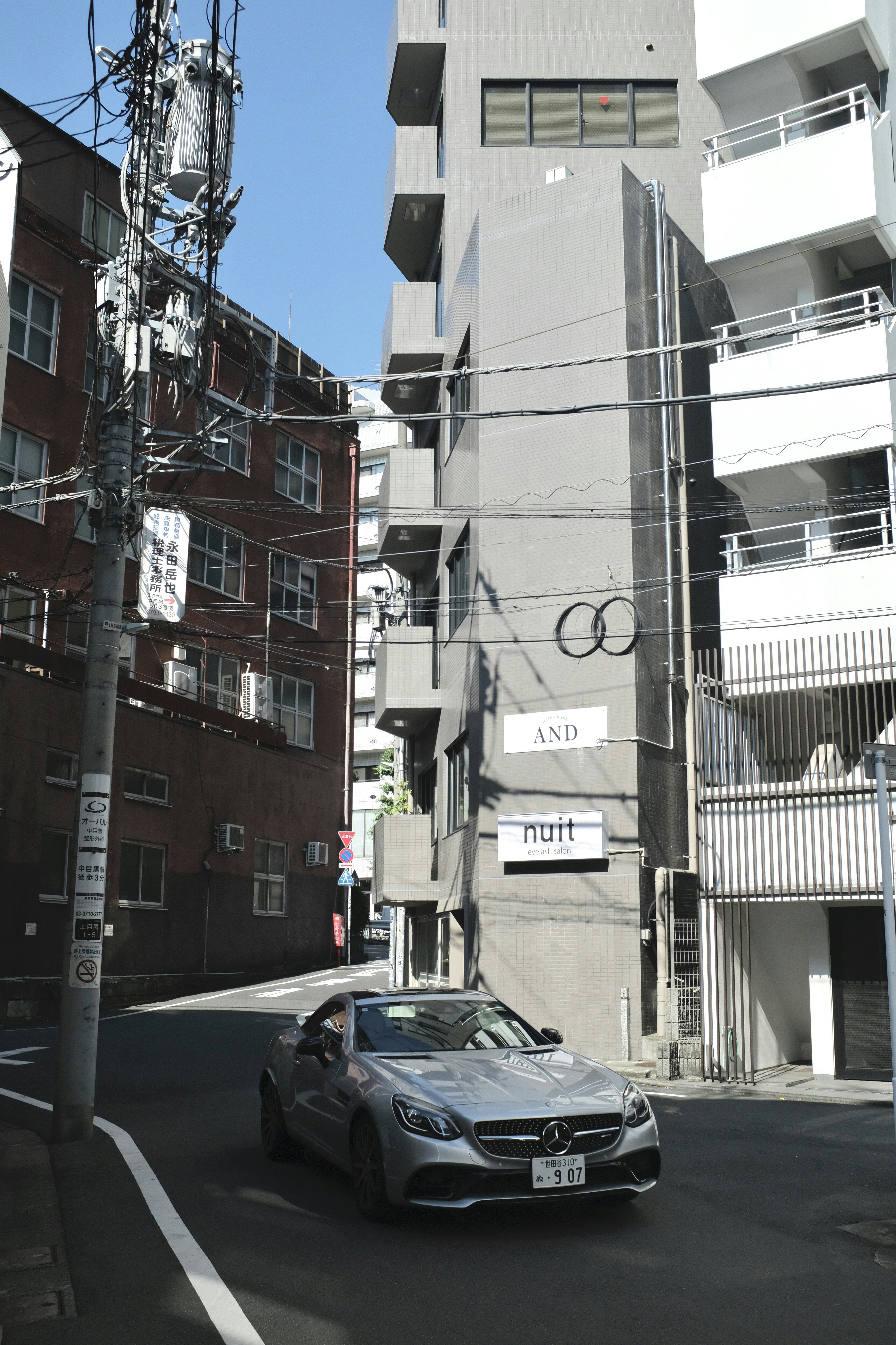 Mercedes on a Narrow Urban Gutter: A Shady Street Portrait