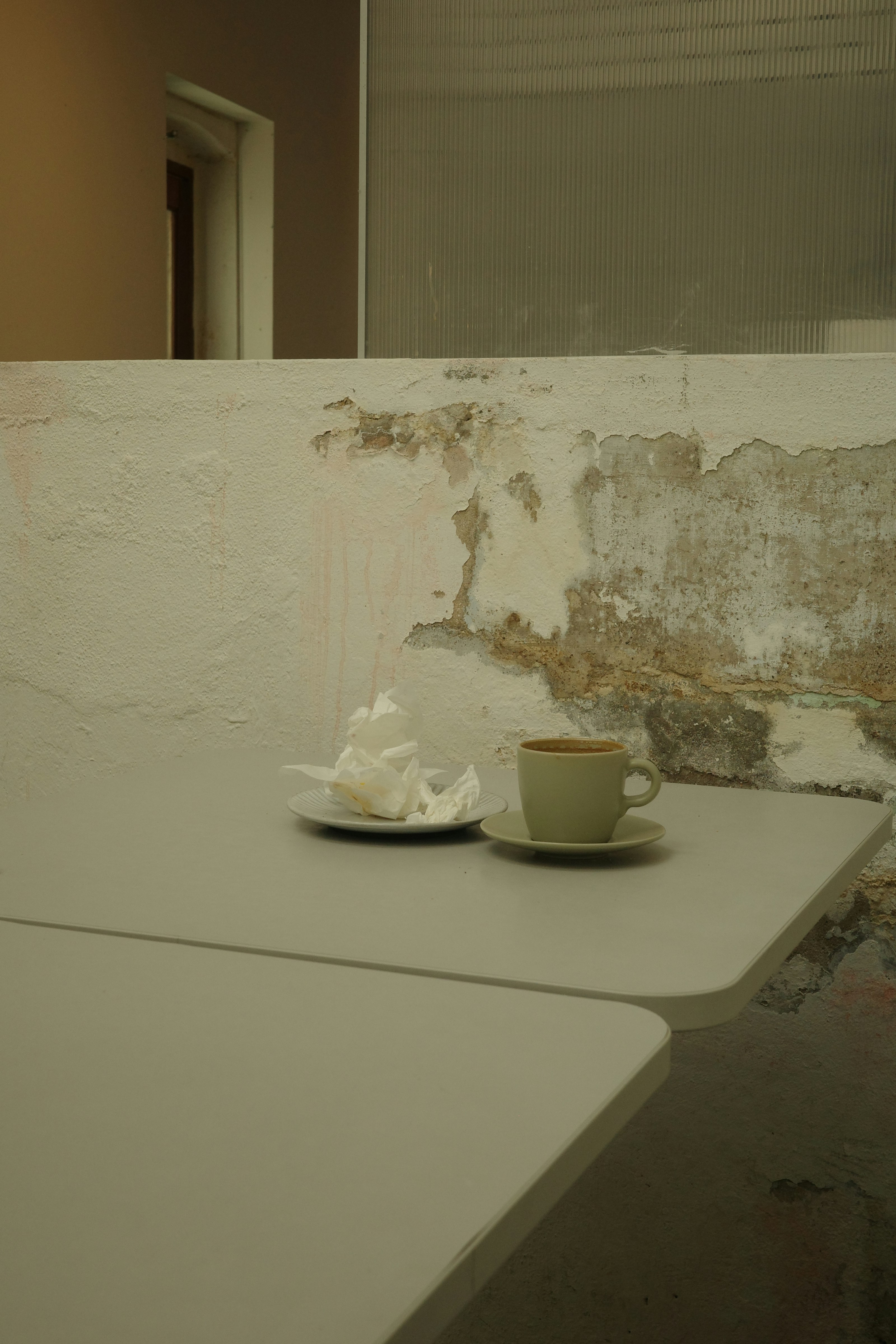 Quiet Cafe Corner with Teacup and Sugar Dish