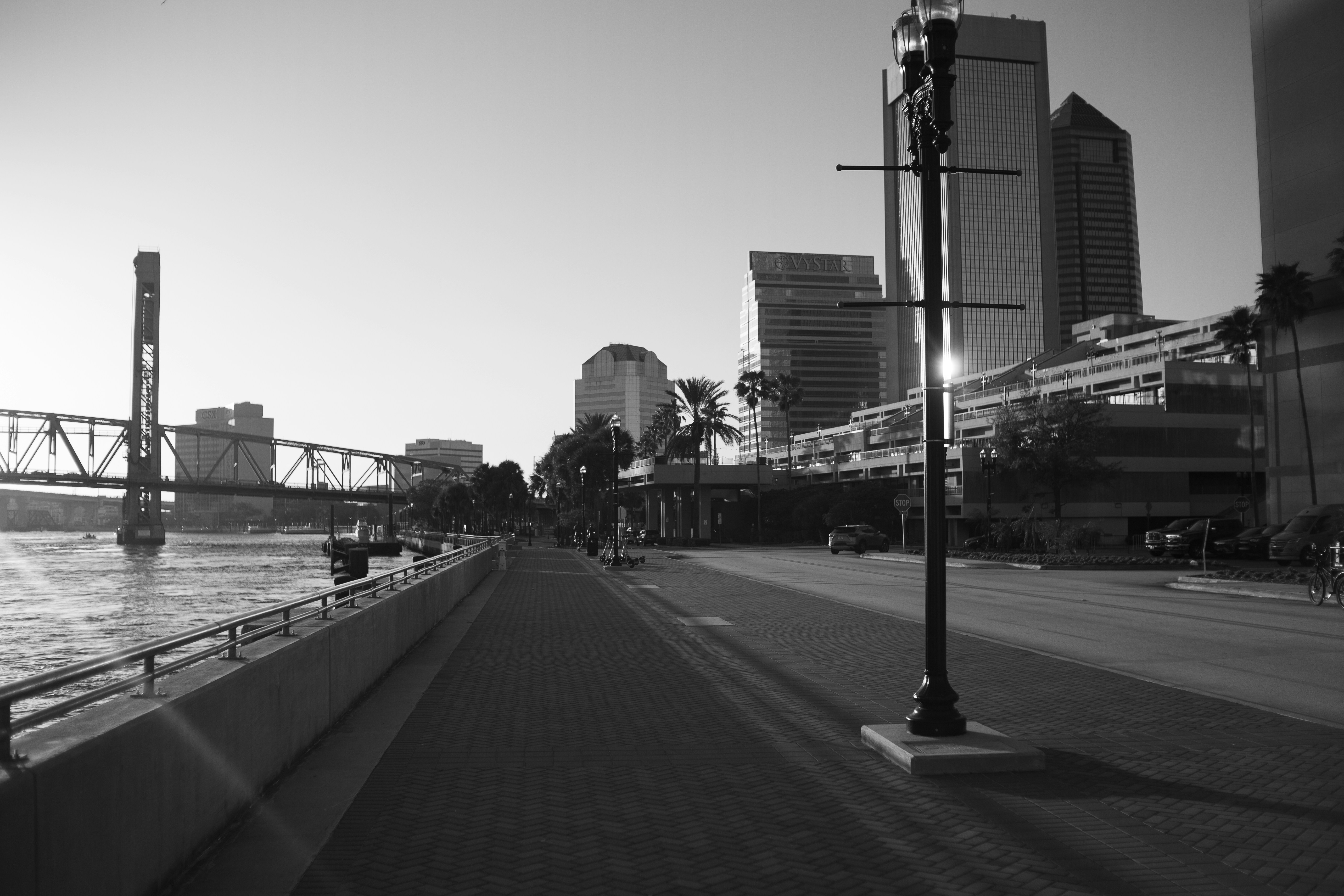 Riverwalk Silhouette: Urban Promenade by the Waterfront
