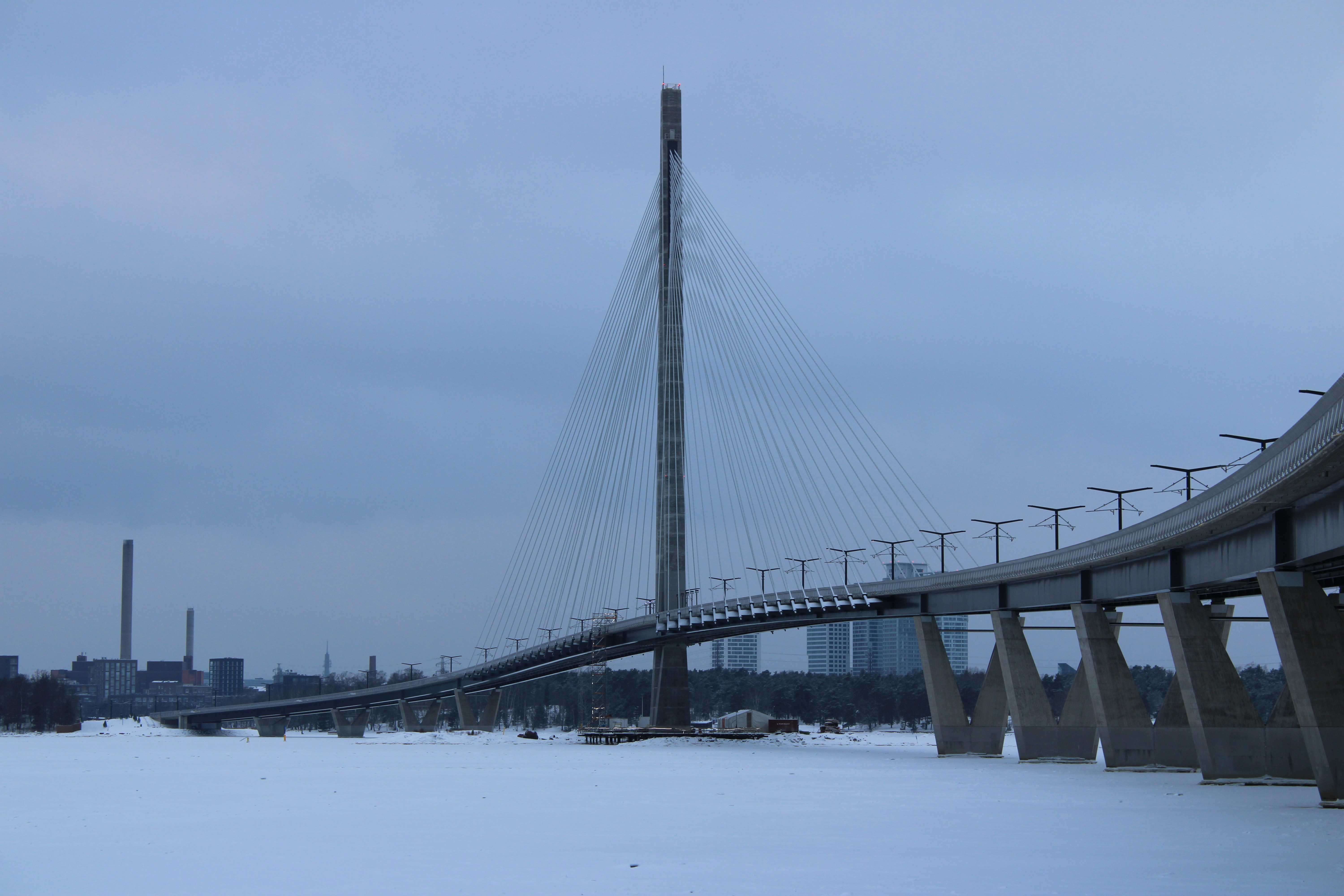 Centre Span of the Cable-Stayed Bridge Over a Snow-Blanketed River