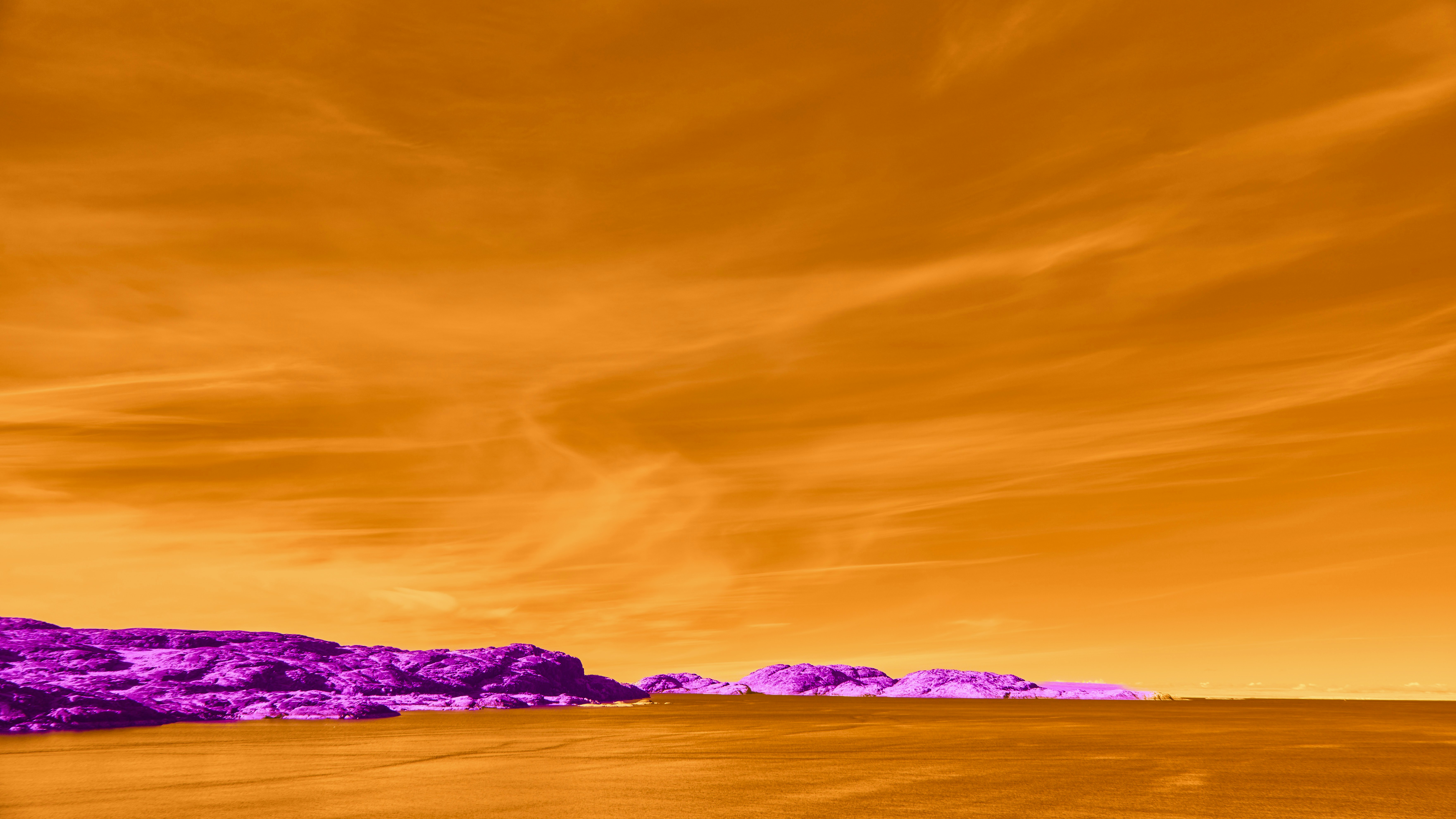 Deserted Horizon Under a Vault of Tangerine Sky
