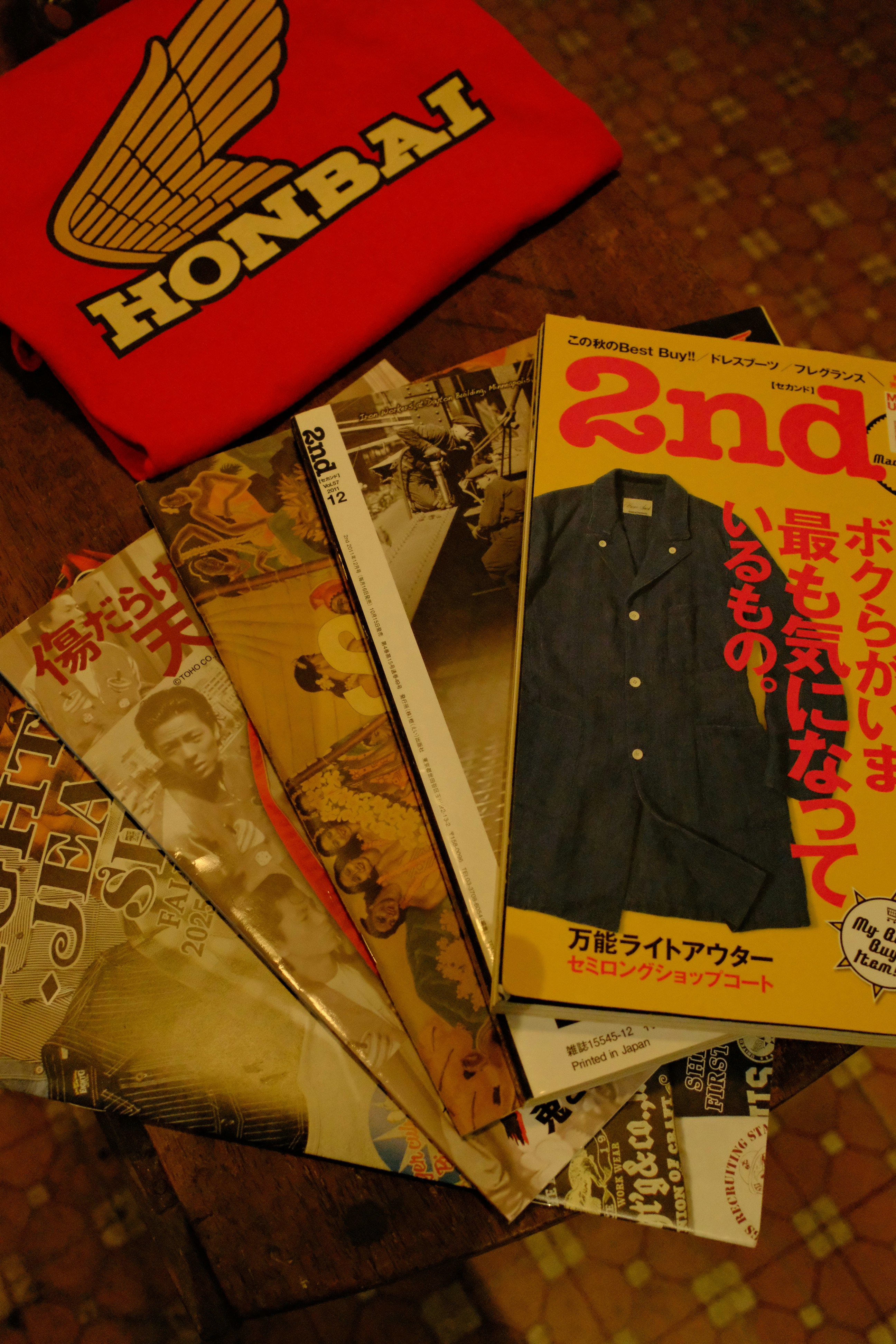 Retro Magazine Stack with a Bold Red Honbai Logo