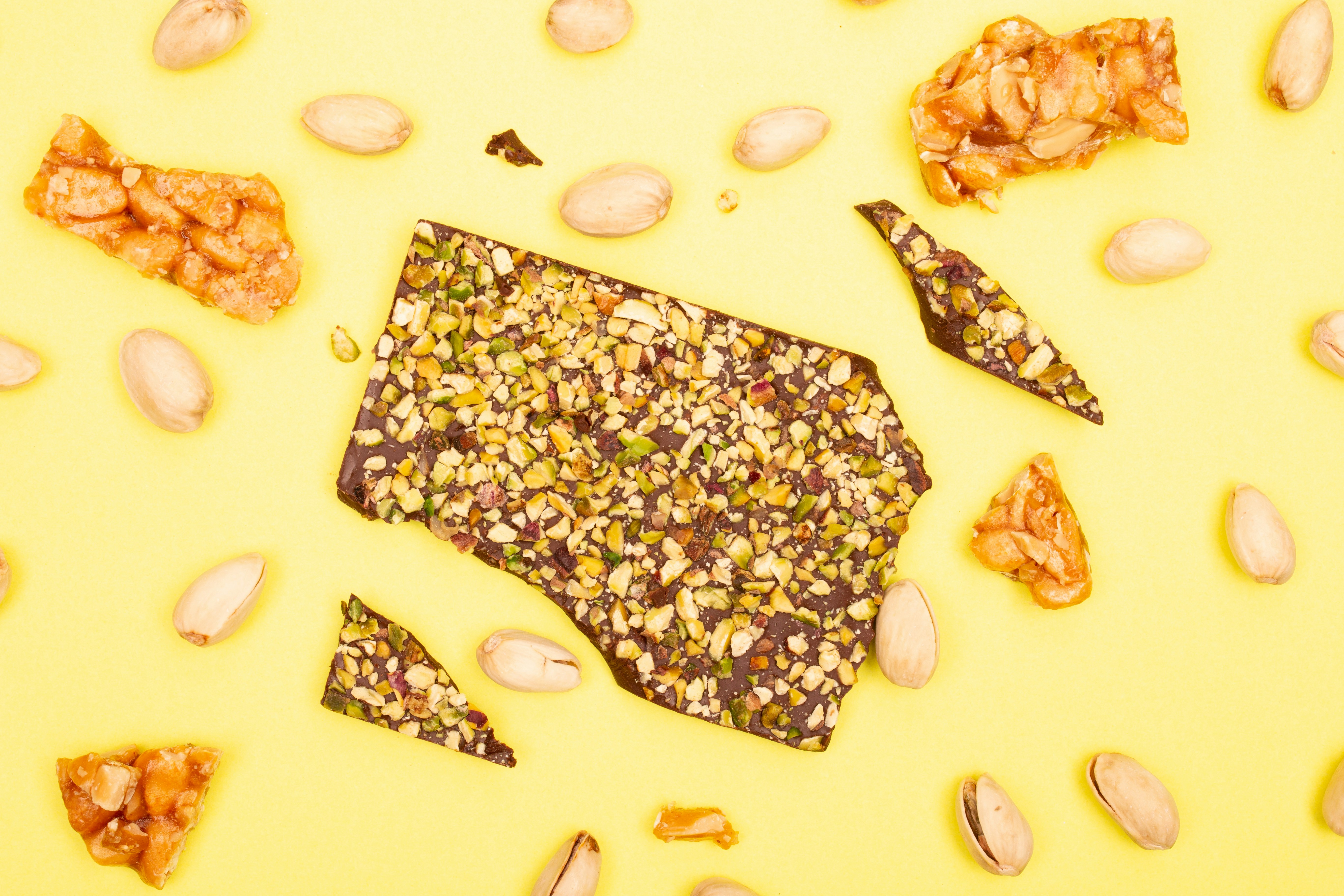 Latticed Chocolate Fragments Amidst Golden Backdrop
