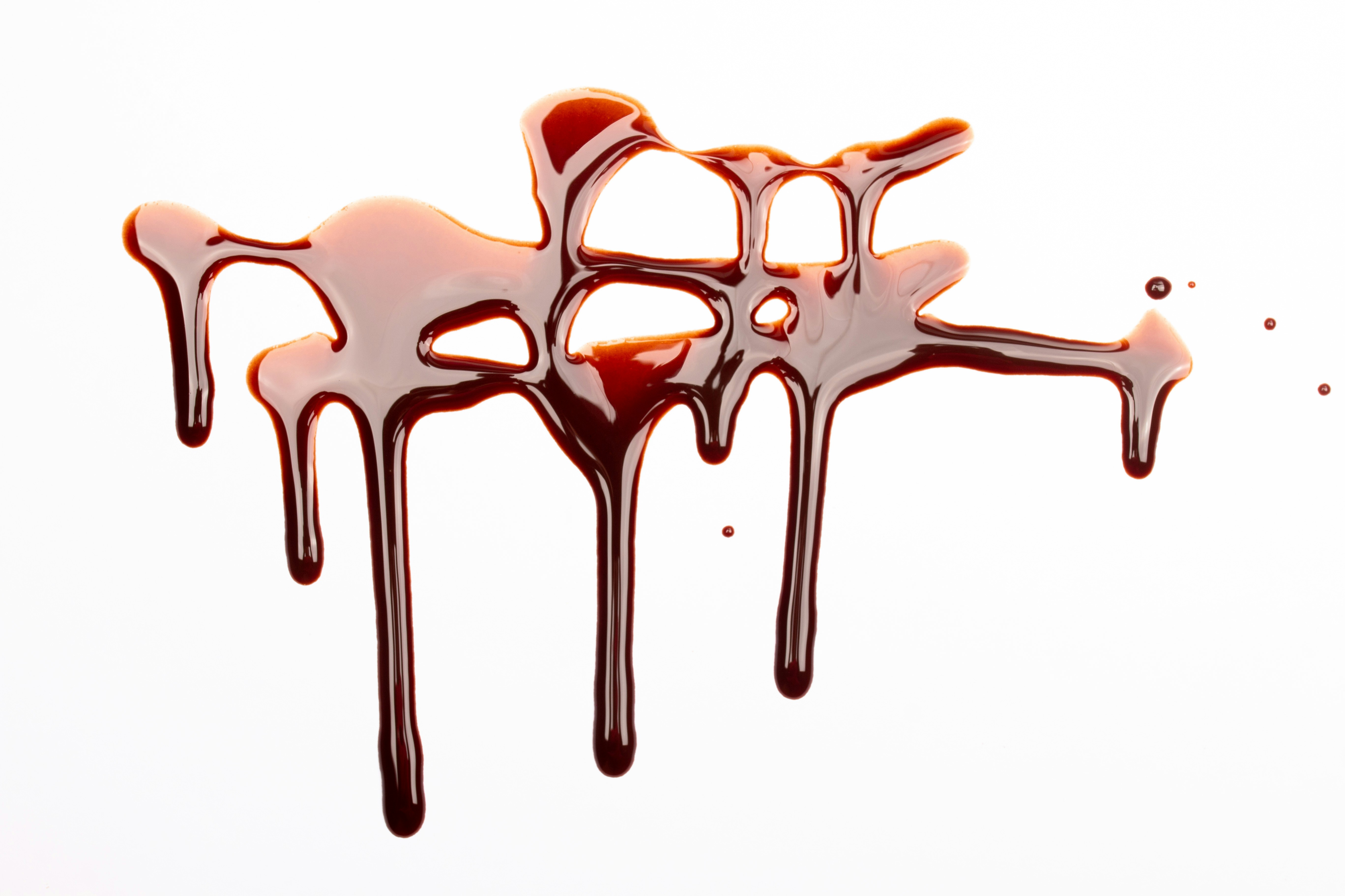 Glossy Red Drips: An Abstract Pour on White Canvas