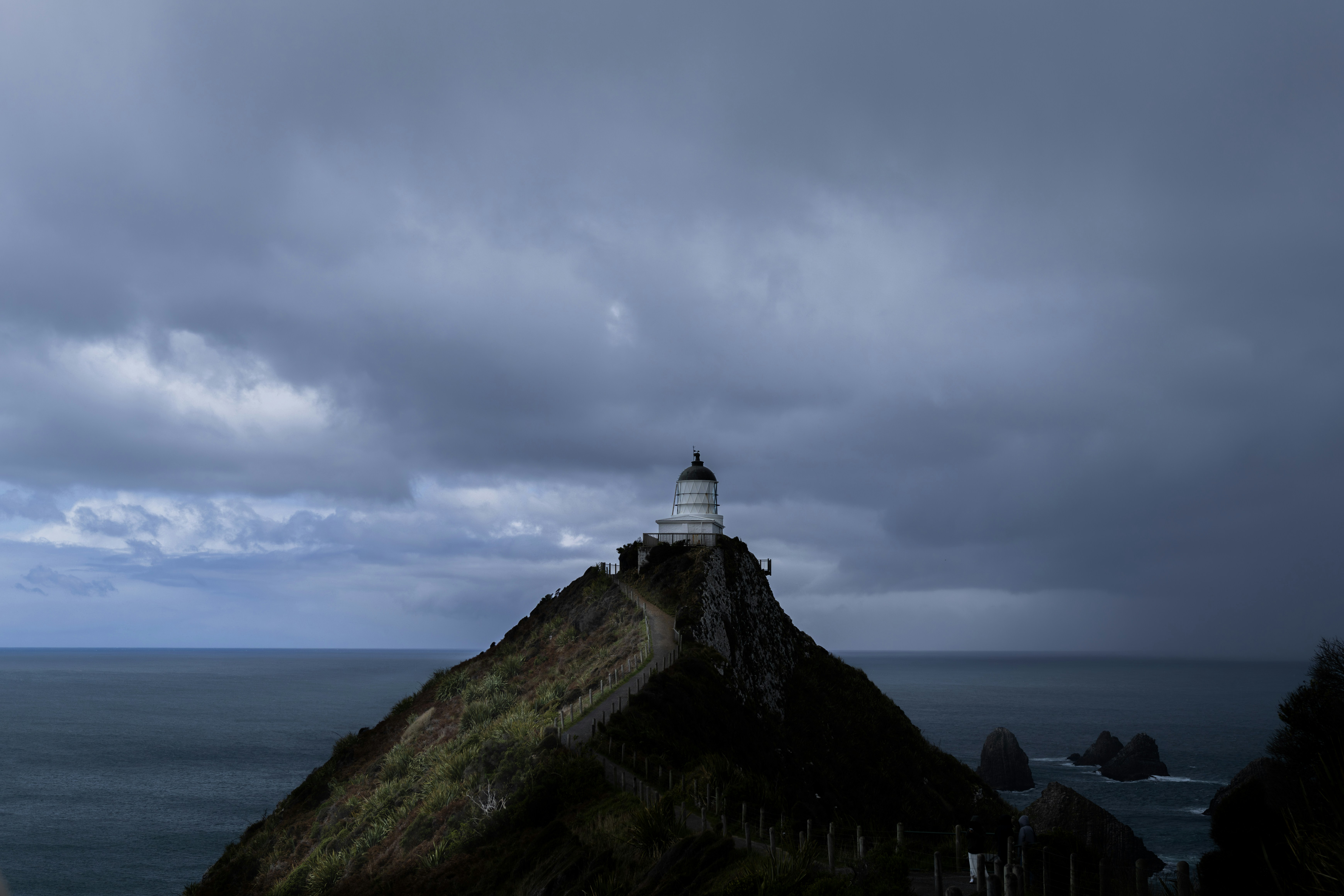 Lighthouse Sentinel on a Windward Peak
