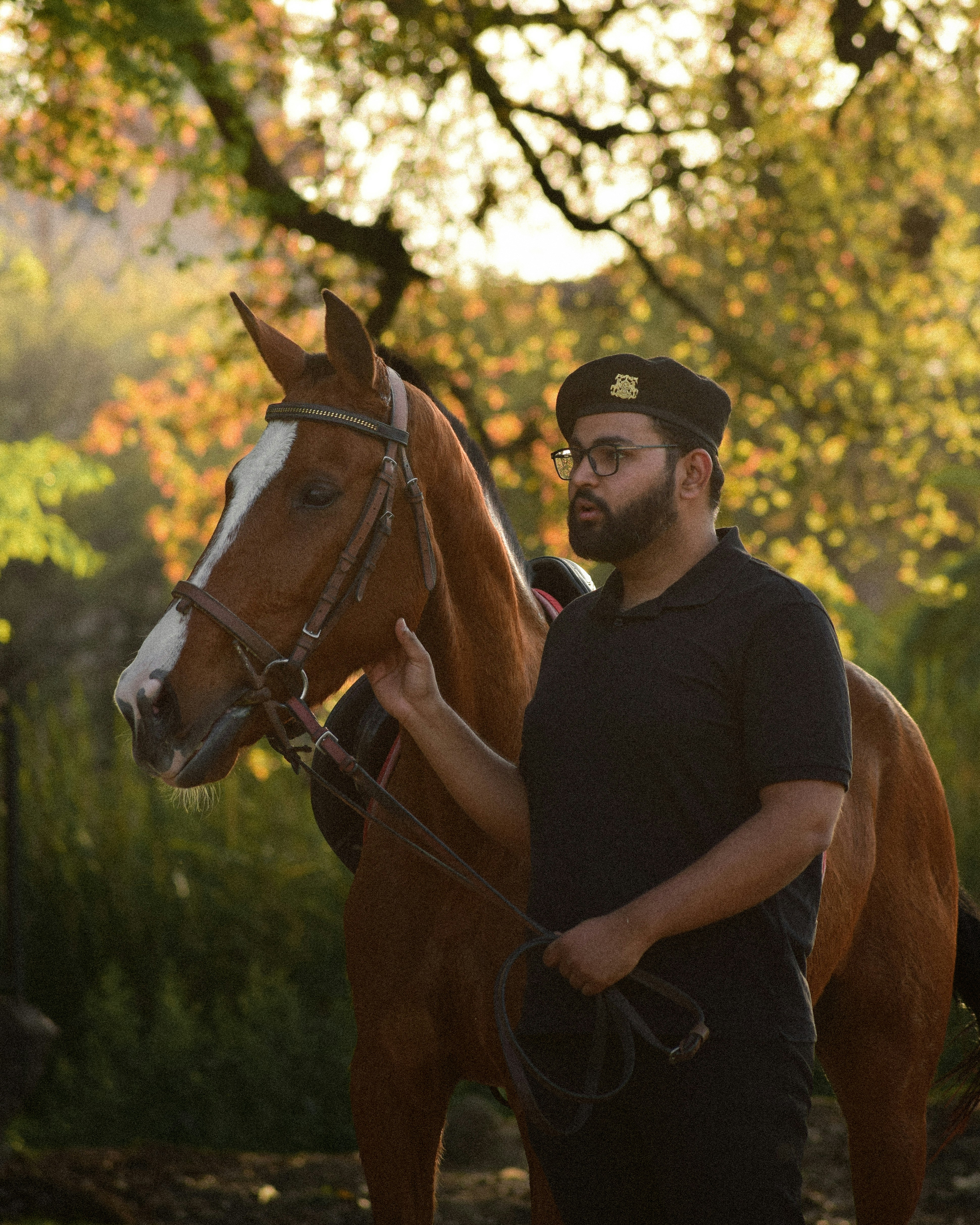 Gentleman and Horse in Dappled Autumn Light