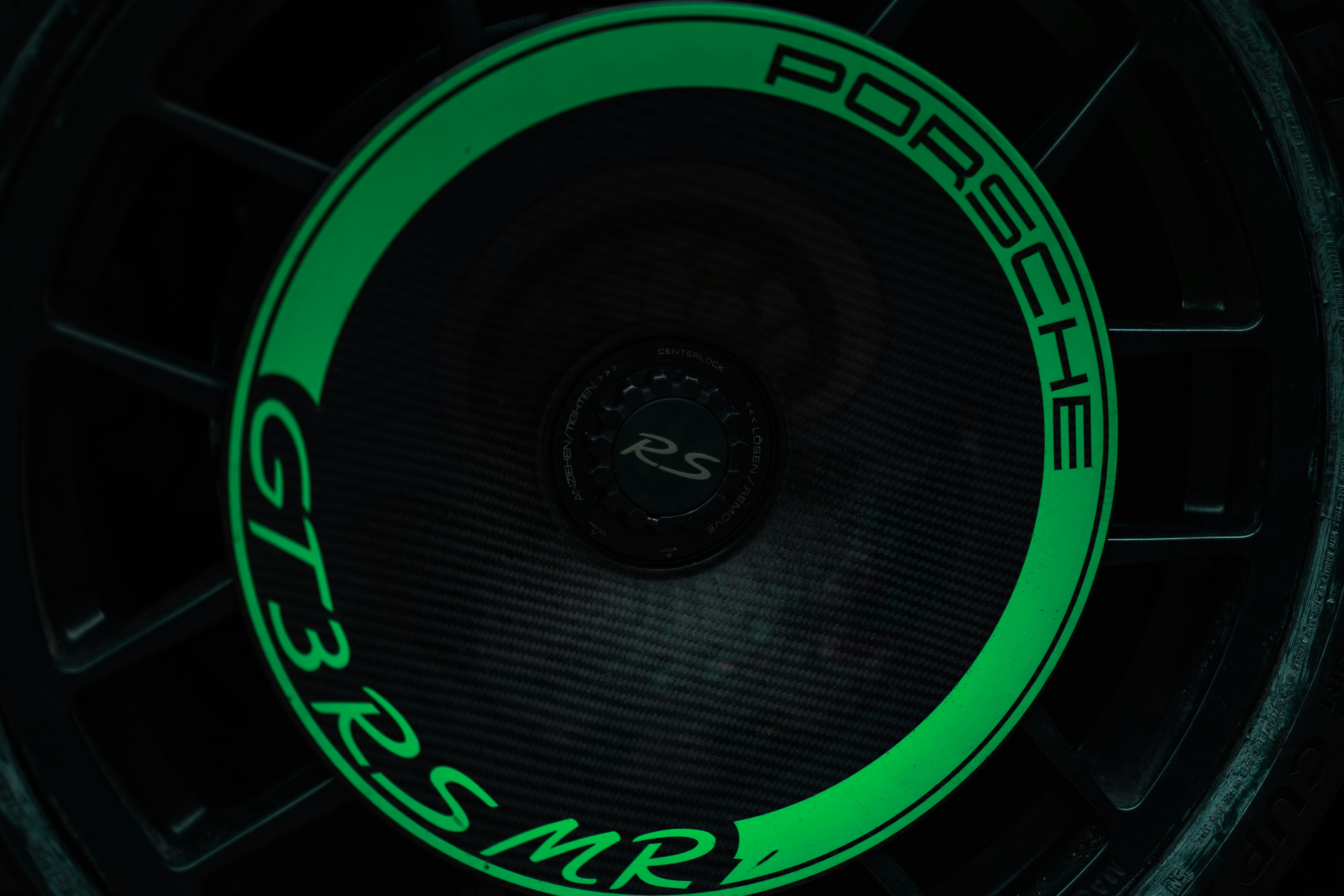Green-on-Black: Porsche RS tire cap centerpiece