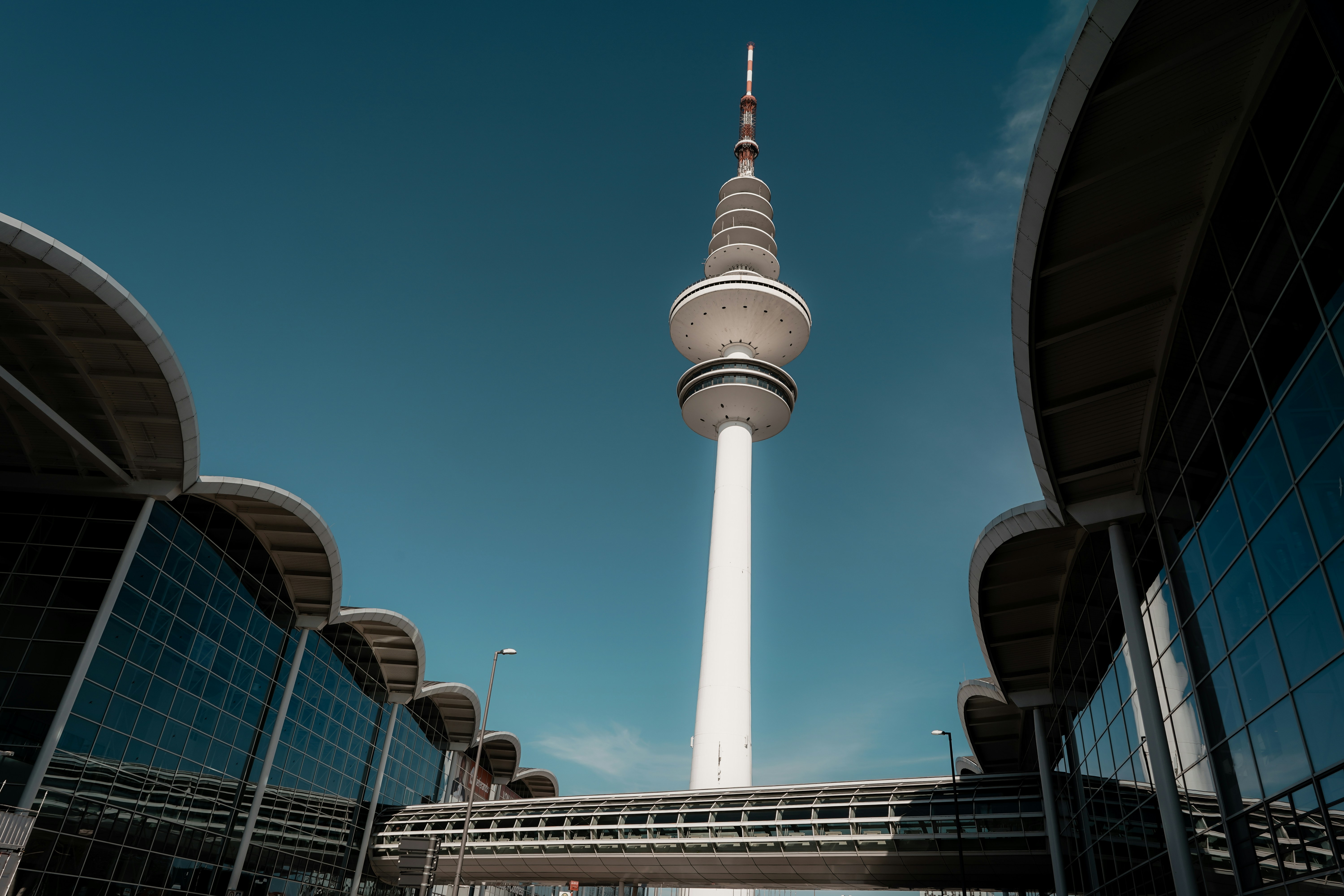 Centerstage Tower: The Spire Framed by Arching Silhouettes